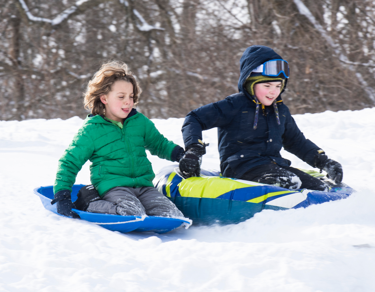 Ann Arbor residents shovel out their driveways and sled ride on Tuesday ...