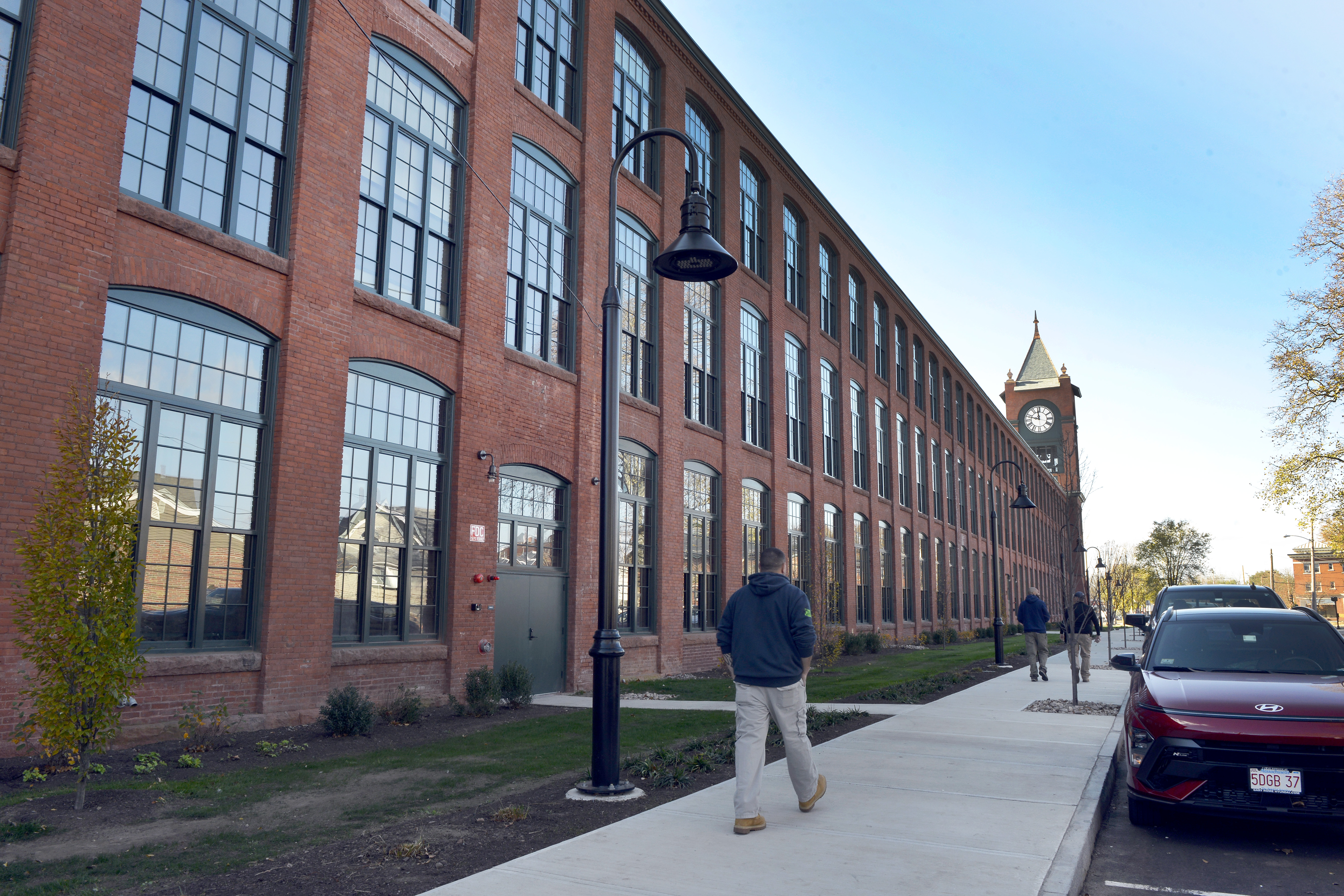 Officials applaud opening of Mill 8 housing at Ludlow Mills - masslive.com