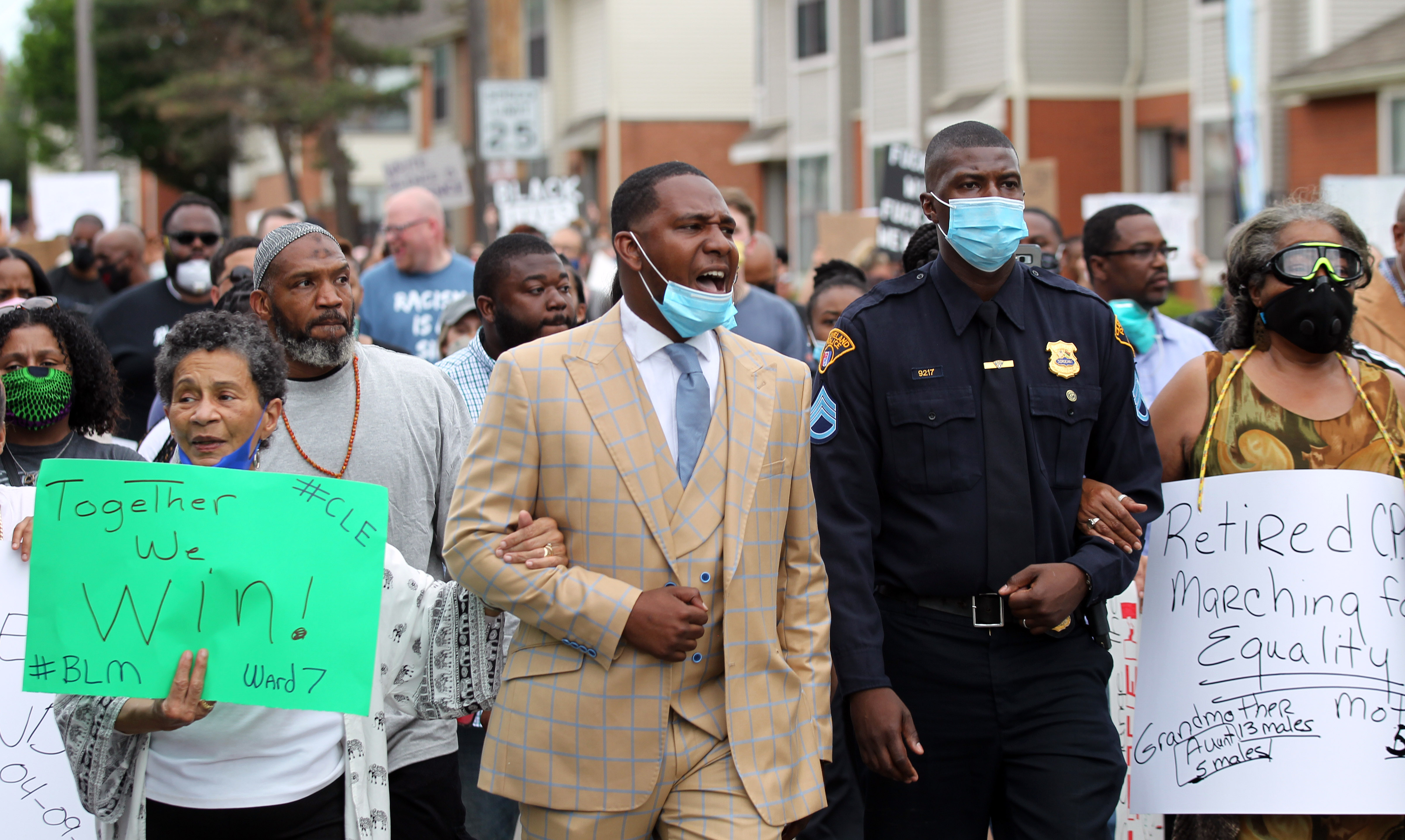 Peaceful protestors march in the "Stand in Solidarity" march, June 4 ...