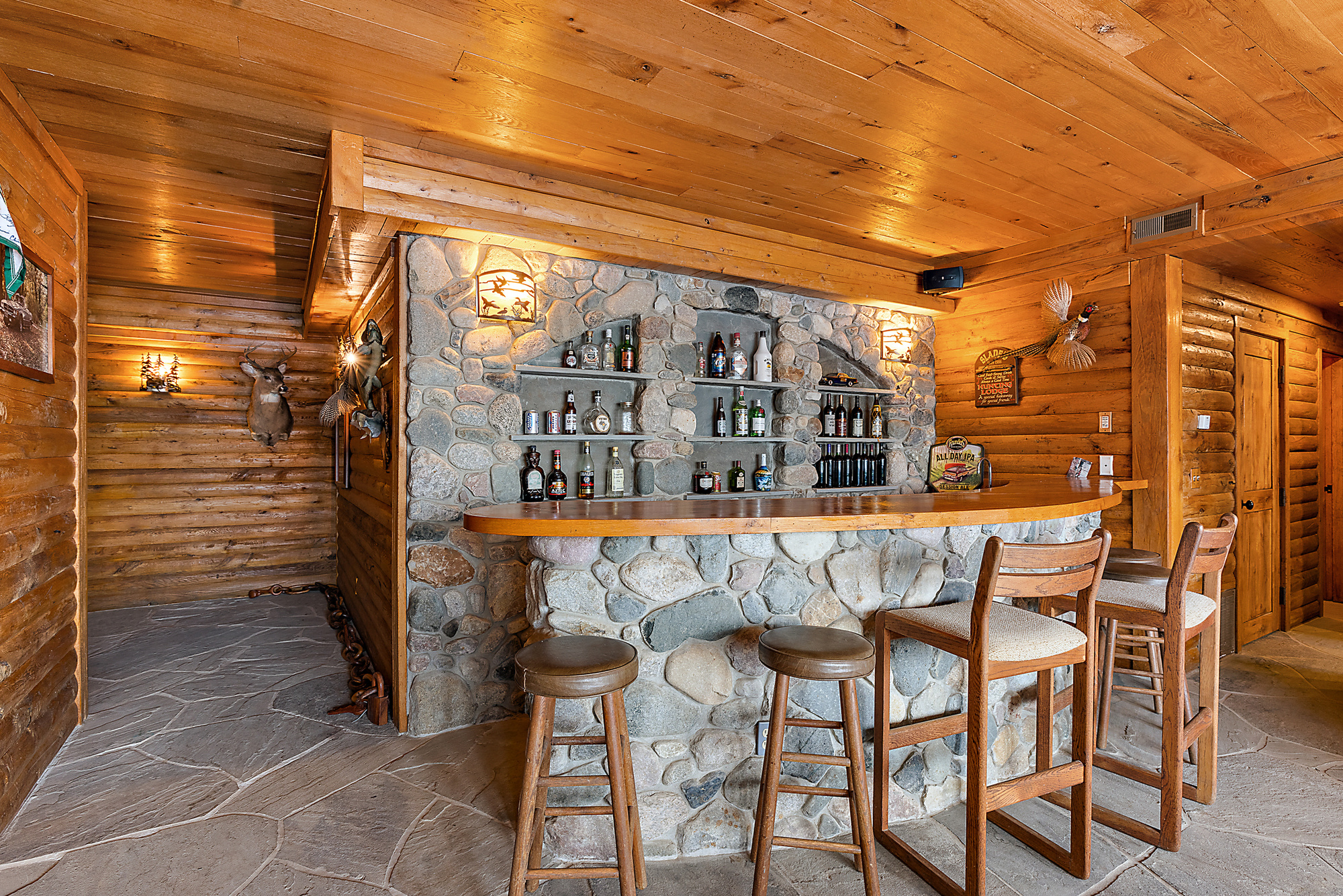 This $6.5 million Michigan home has hidden passageways, slides and a ...