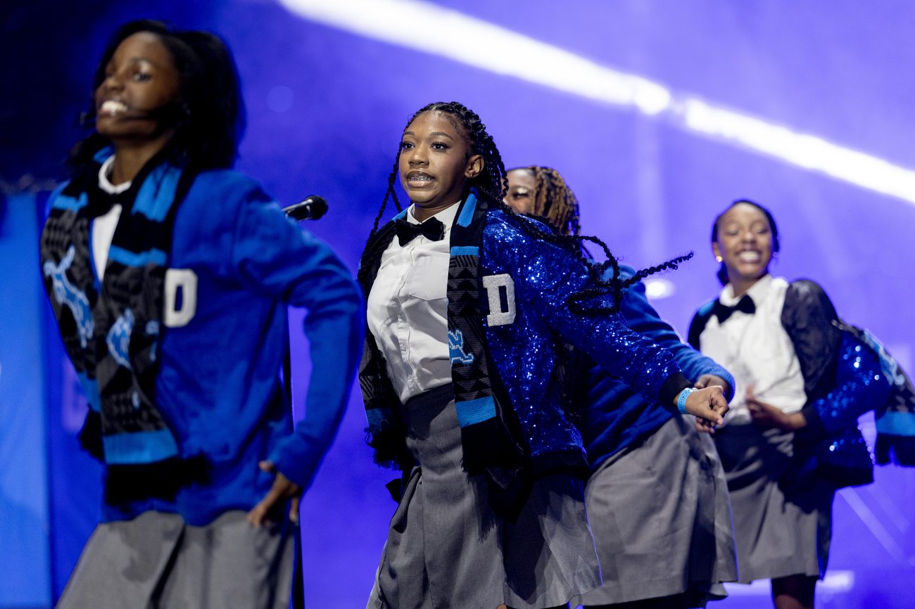 Detroit Youth Choir performs at halftime of Lions' first playoff win in ...