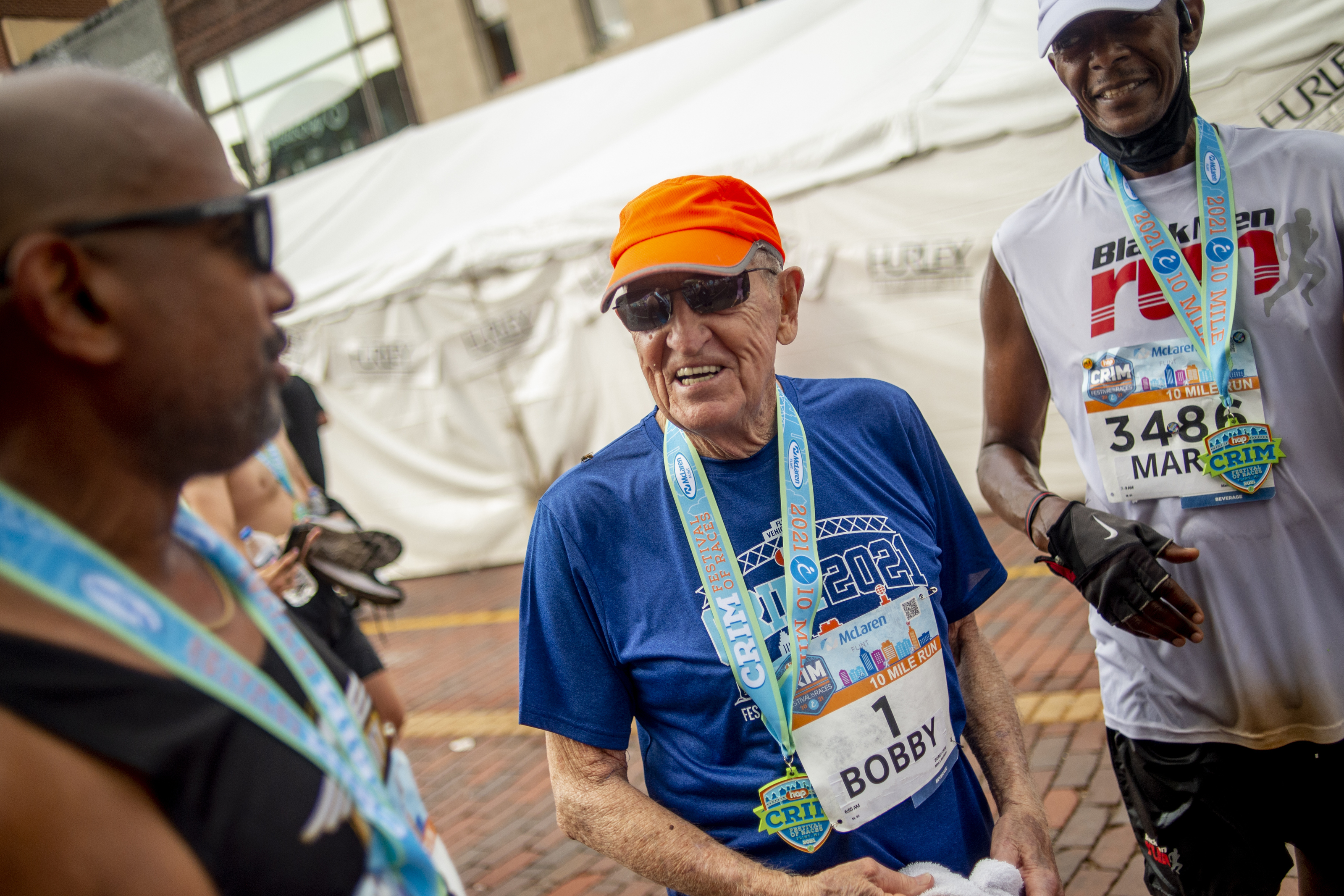 Founder Bobby Crim finishes 45th consecutive 10-mile race at HAP Crim ...