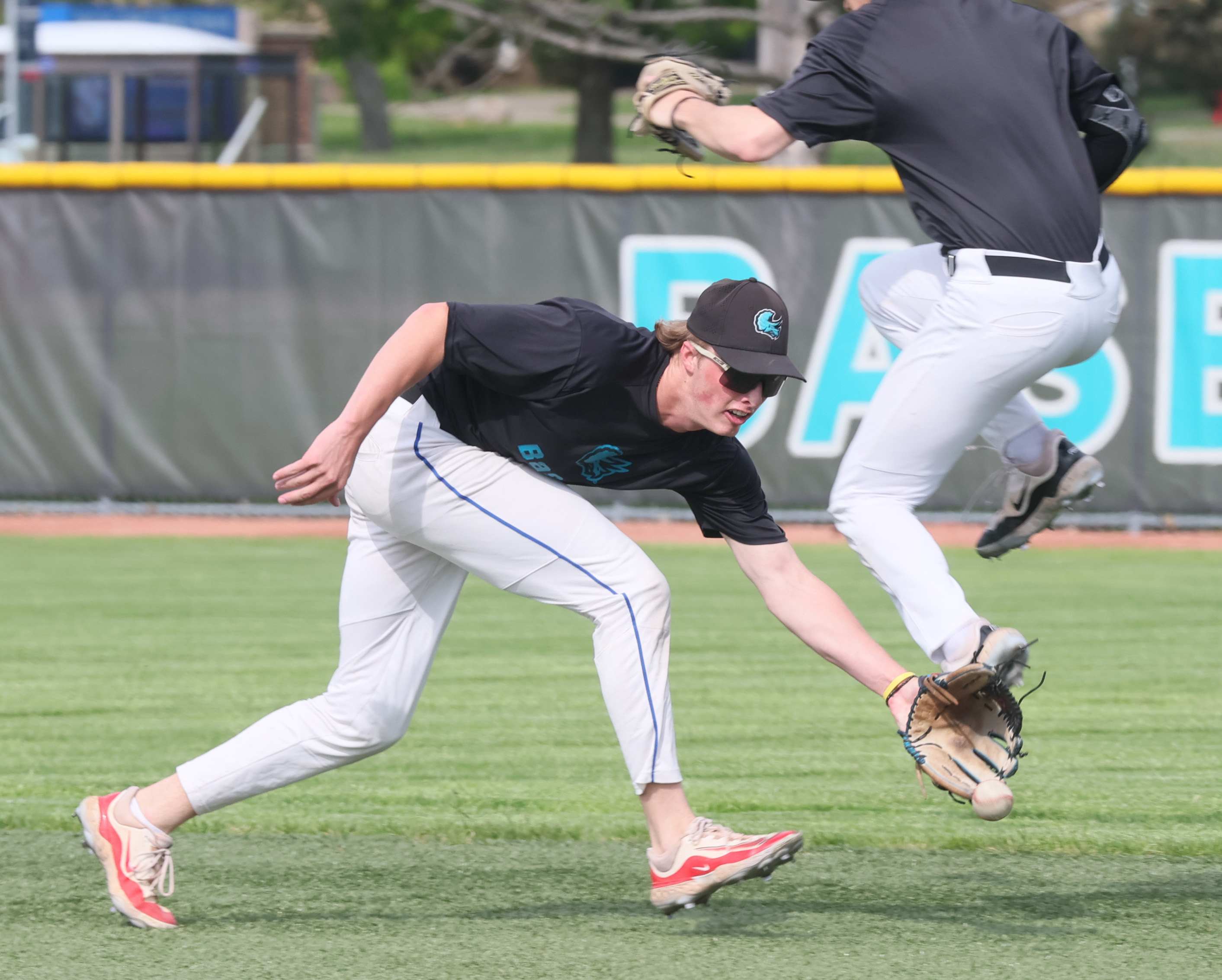 The Tri-C Triceratops baseball team practices before the start of their division playoffs ...