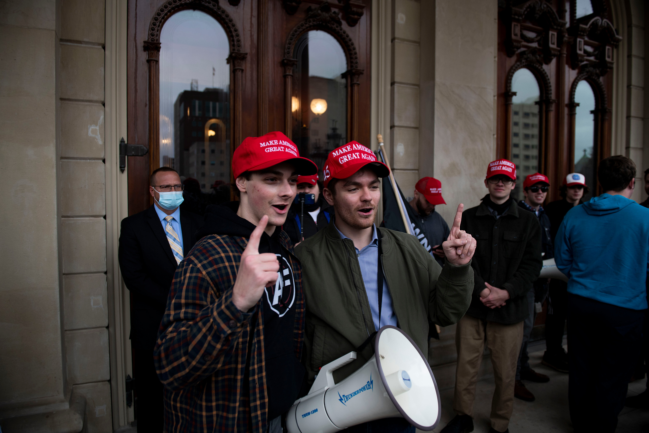 Far right activists rally at Michigan State Capitol Building on ...