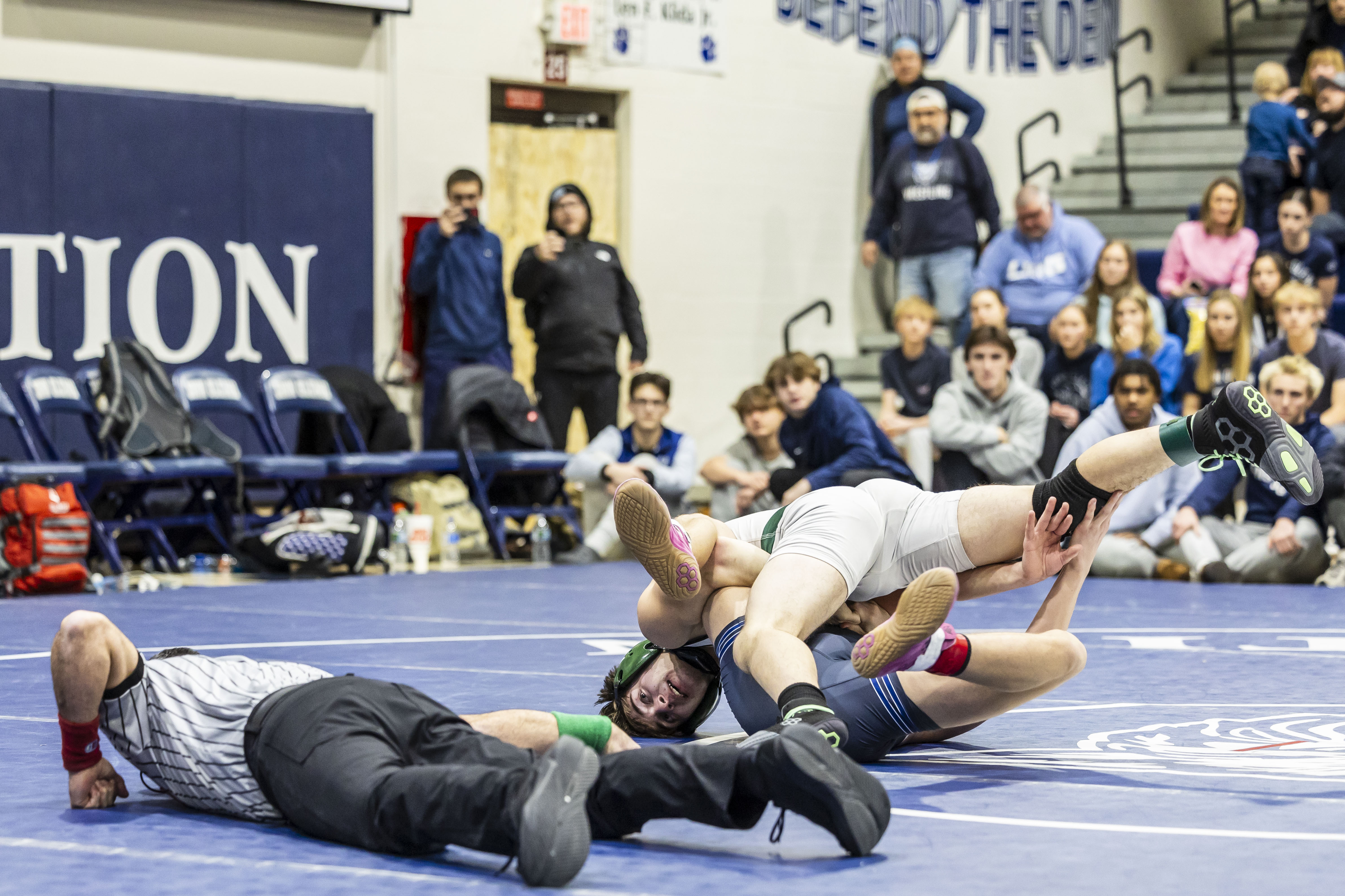 Freeland takes down John Glenn in Division 2 team wrestling district ...