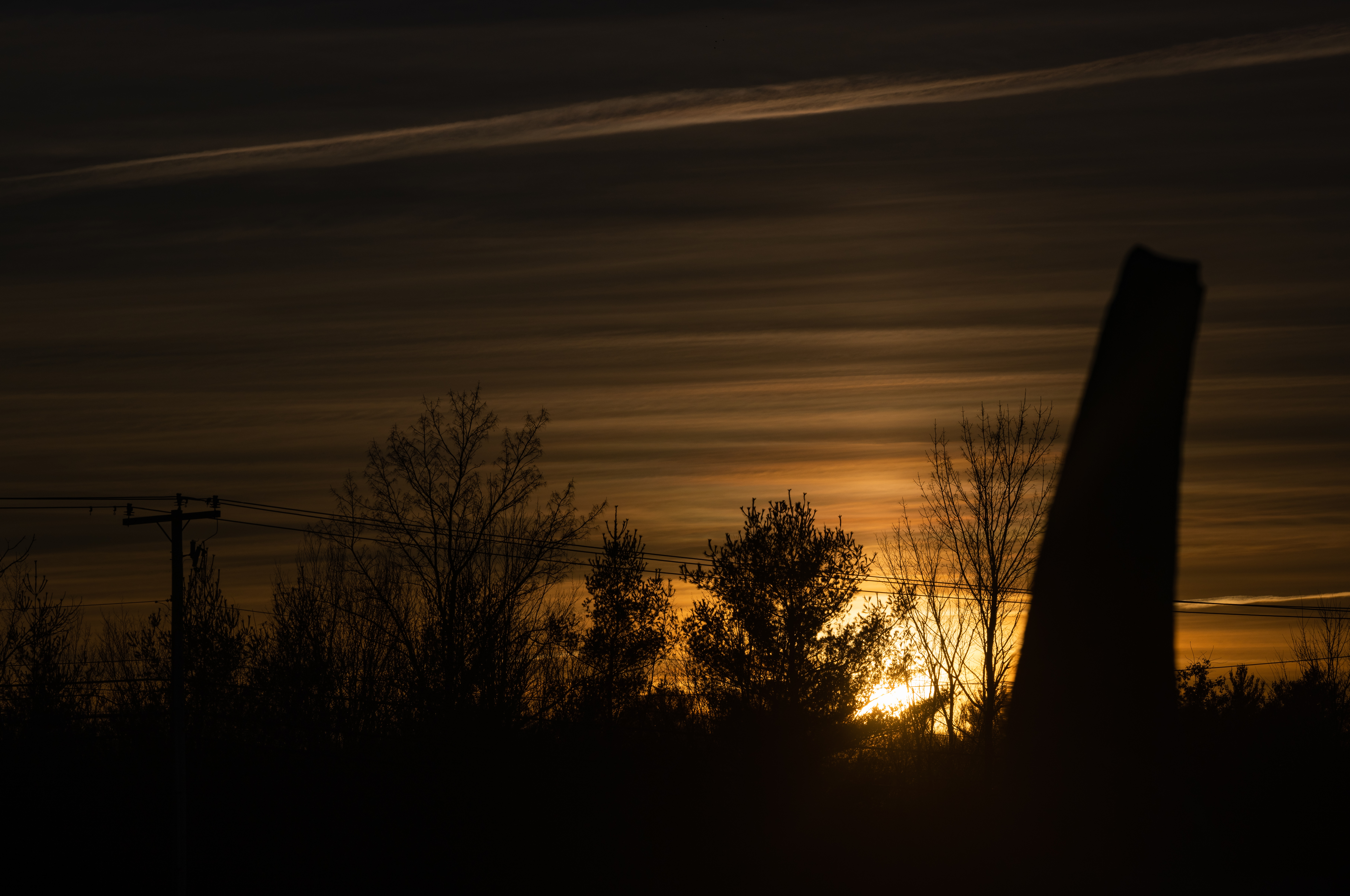 Guests observe winter solstice sunset at the UMass Amherst Sunwheel ...