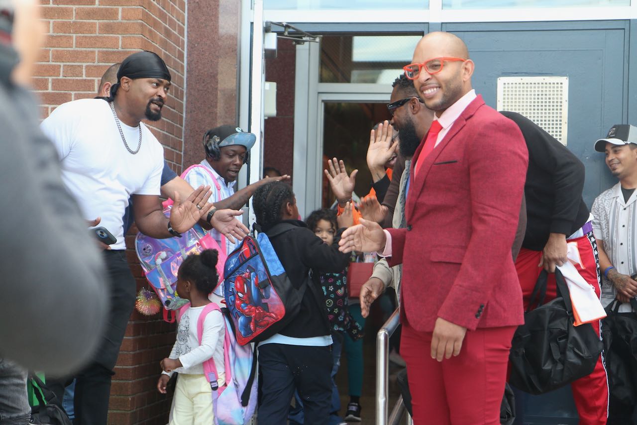Dads and kids celebrate National Dads Take Your Child to School Day in ...