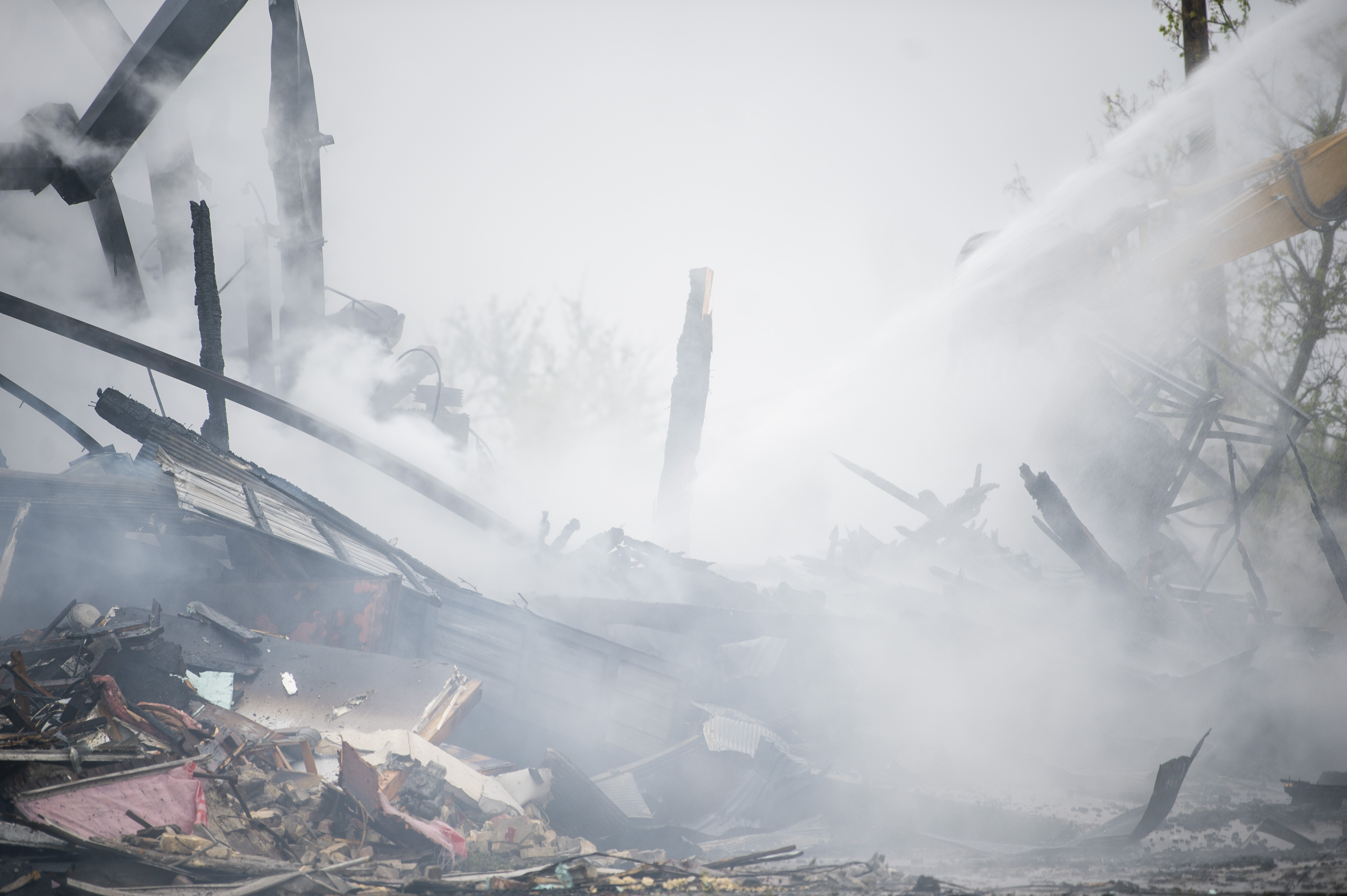 First responders battle building fire at Pajot Feed and Supply in ...