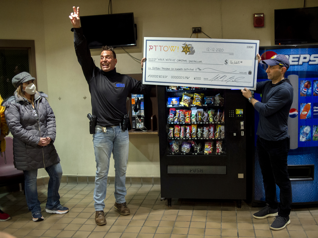 Genesee County sheriff’s program provides 200 gift boxes in ‘Walk with ...