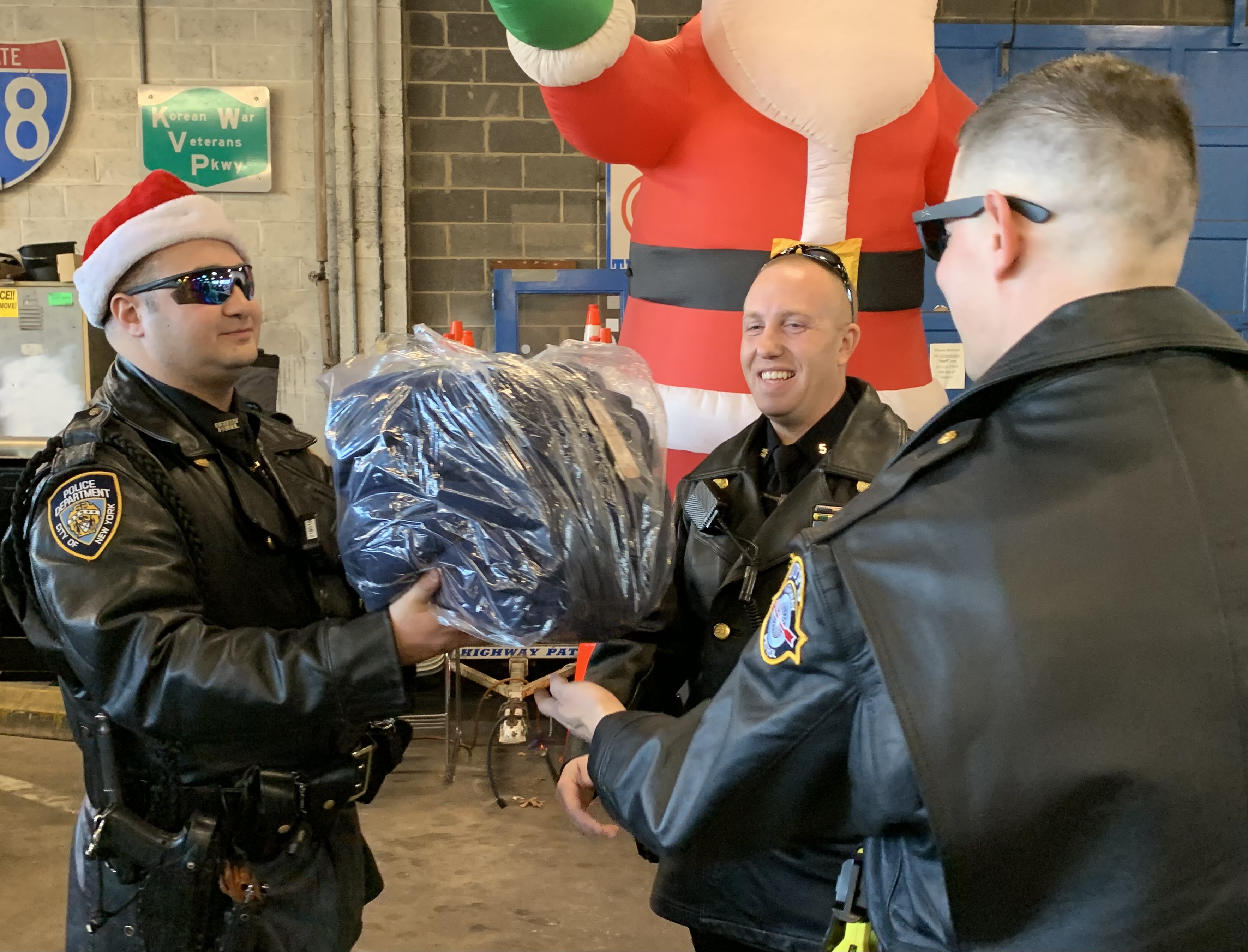 Santa and Highway Patrol Unit 5 deliver gifts to the children at Seton ...