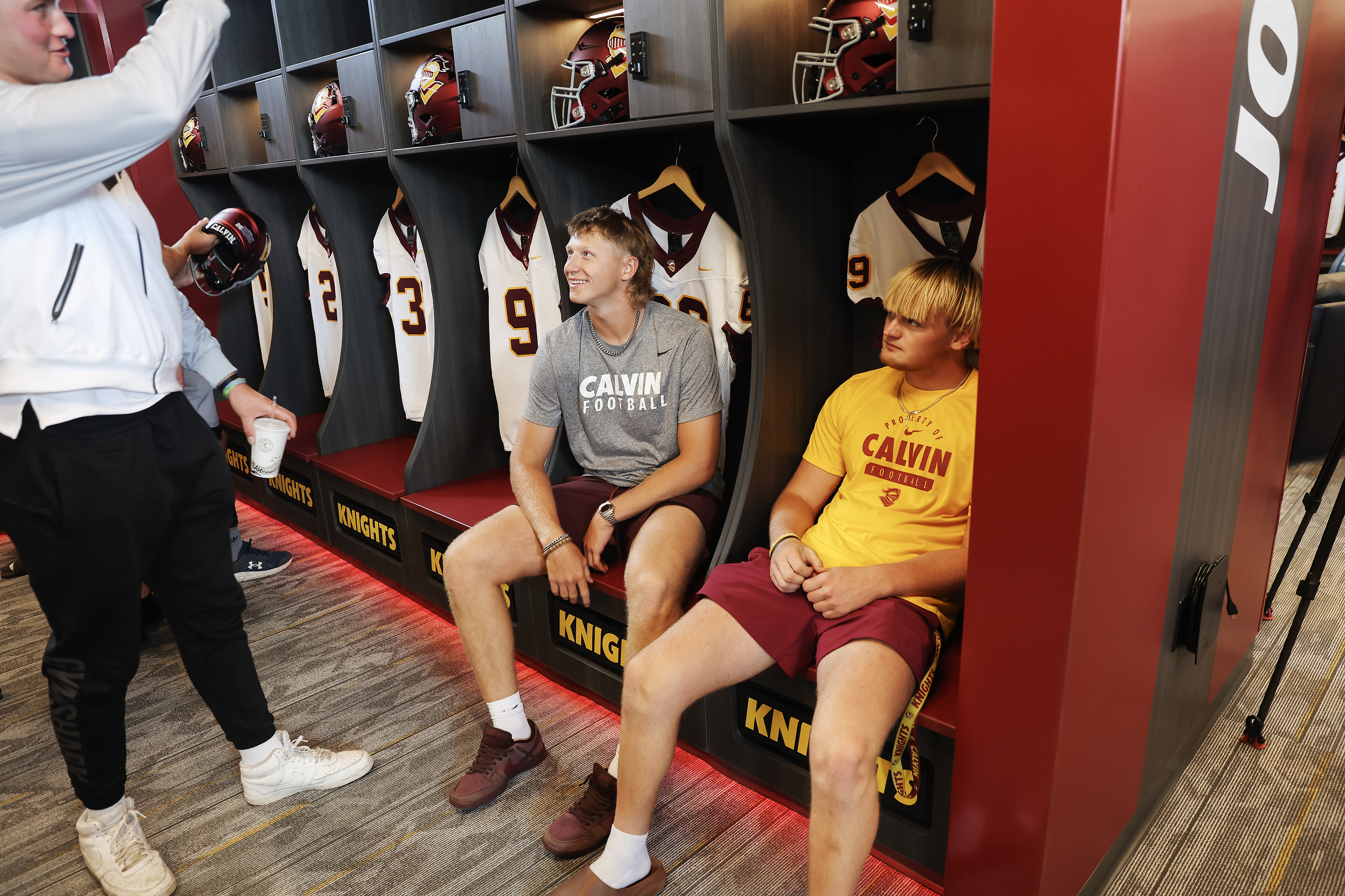 Calvin football players see their newly built locker room for the first ...