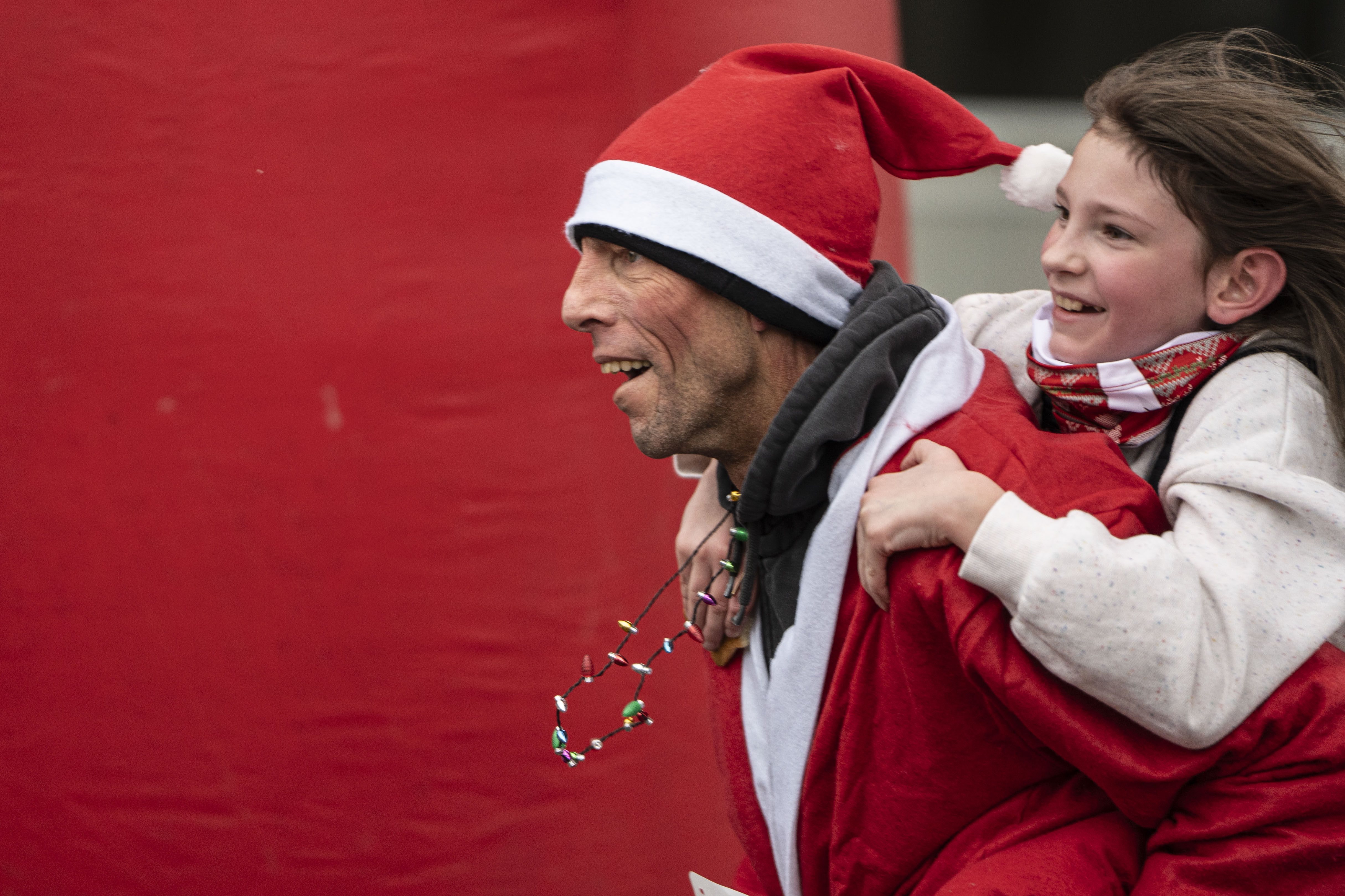 Hundreds put on their red suits for the YMCA Santa Run - mlive.com