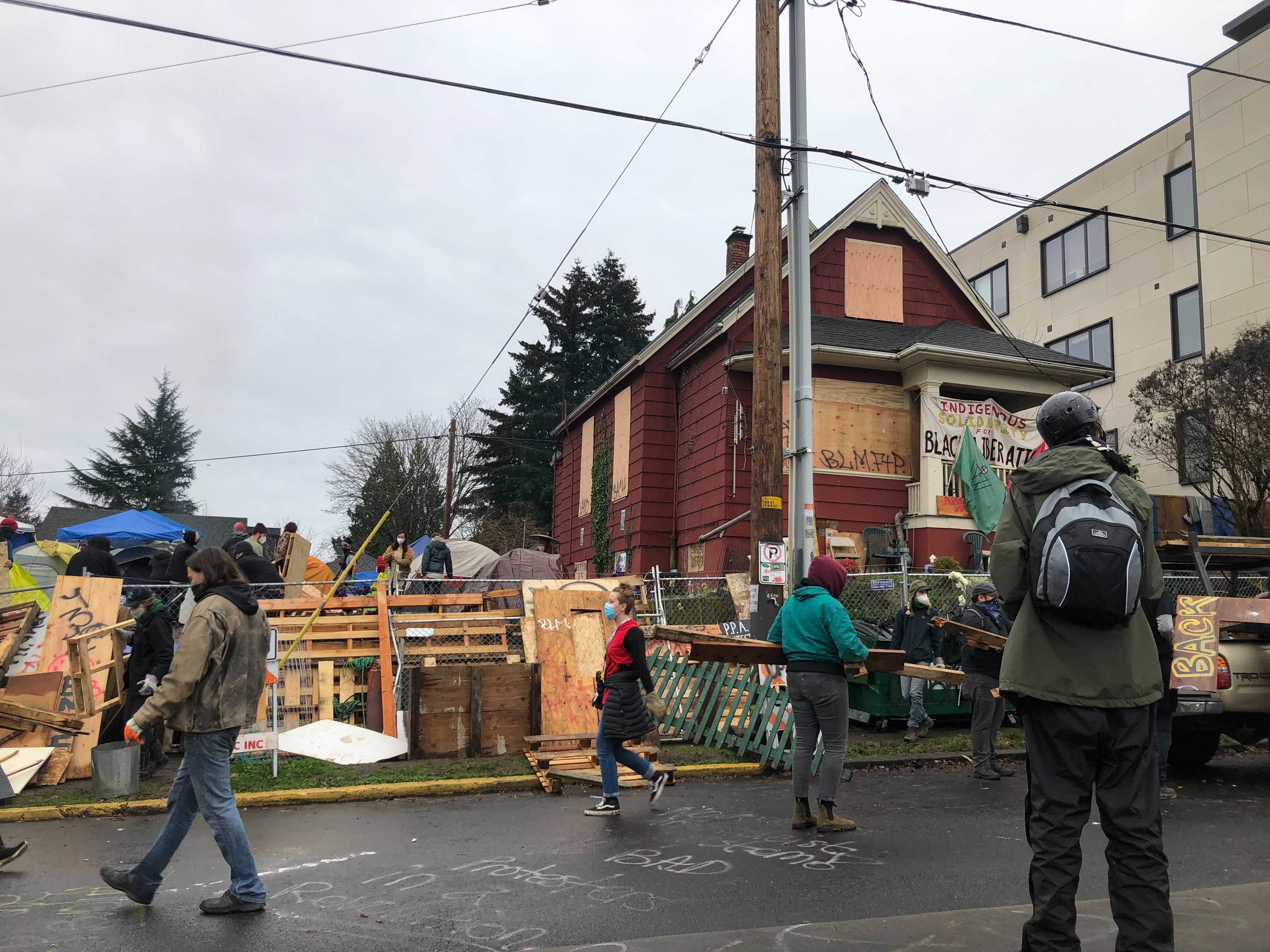 "Red House" barricade deconstruction underway - oregonlive.com