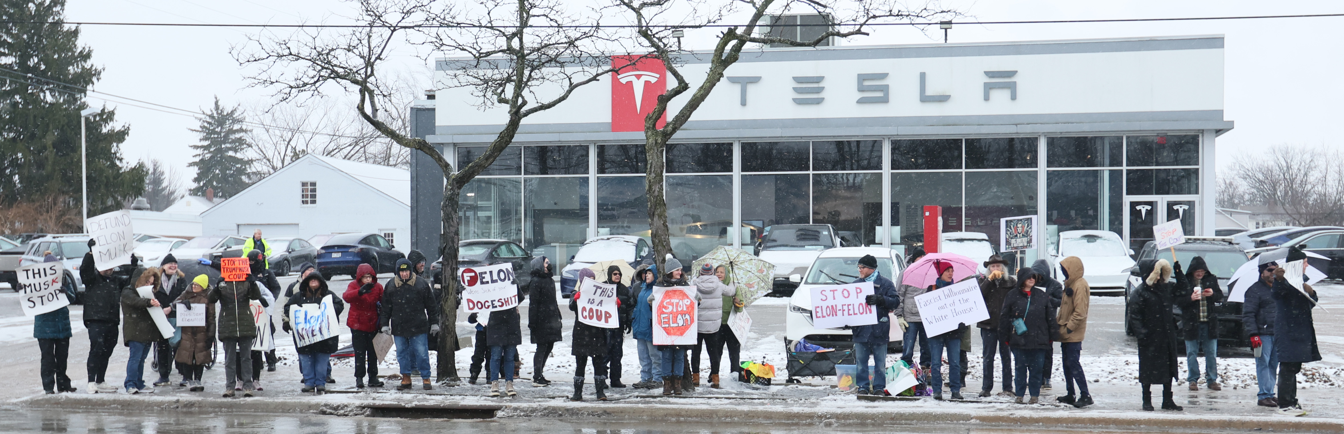 Rally at Tesla Motors Cleveland in Lyndhurst in protest of Elon Musk’s ...