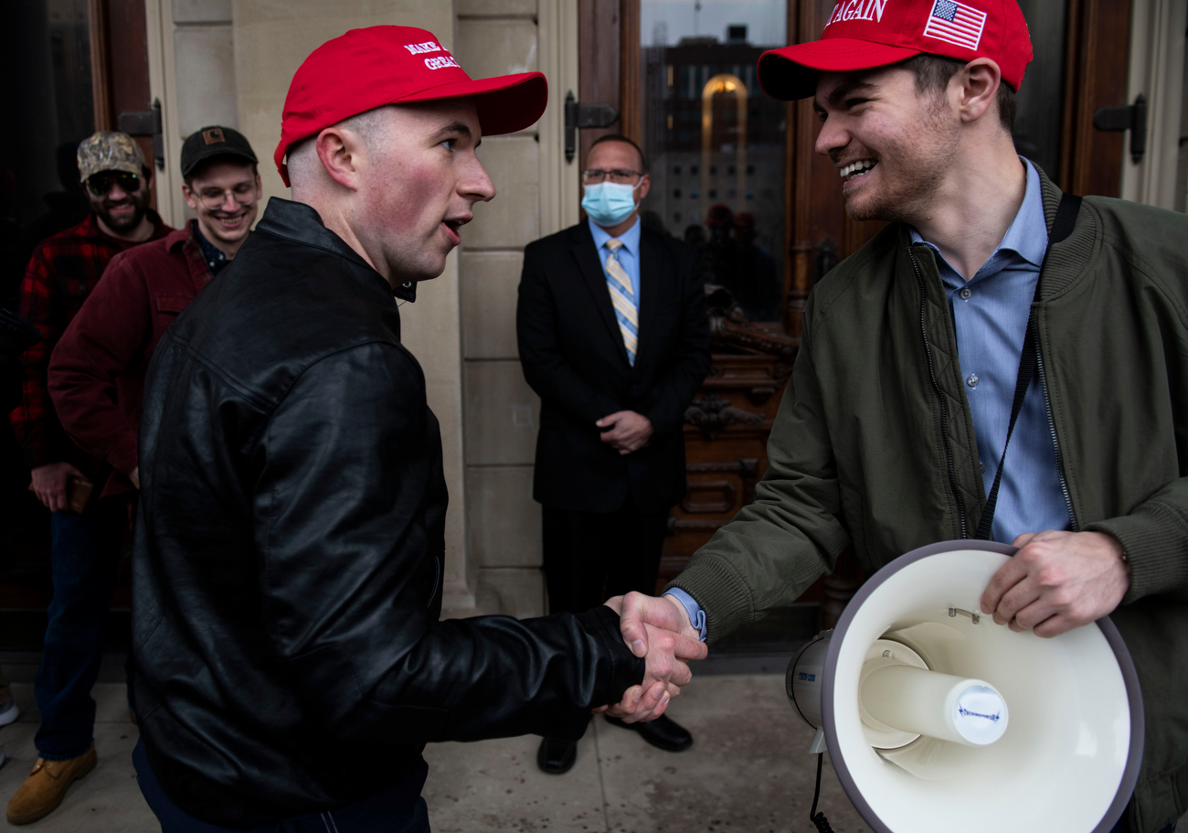 Far right activists rally at Michigan State Capitol Building on ...