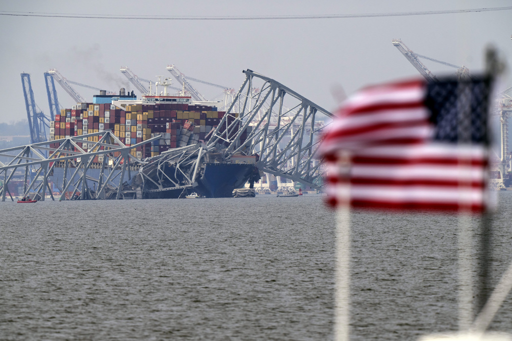 Baltimore bridge collapses after powerless cargo ship rams into support ...