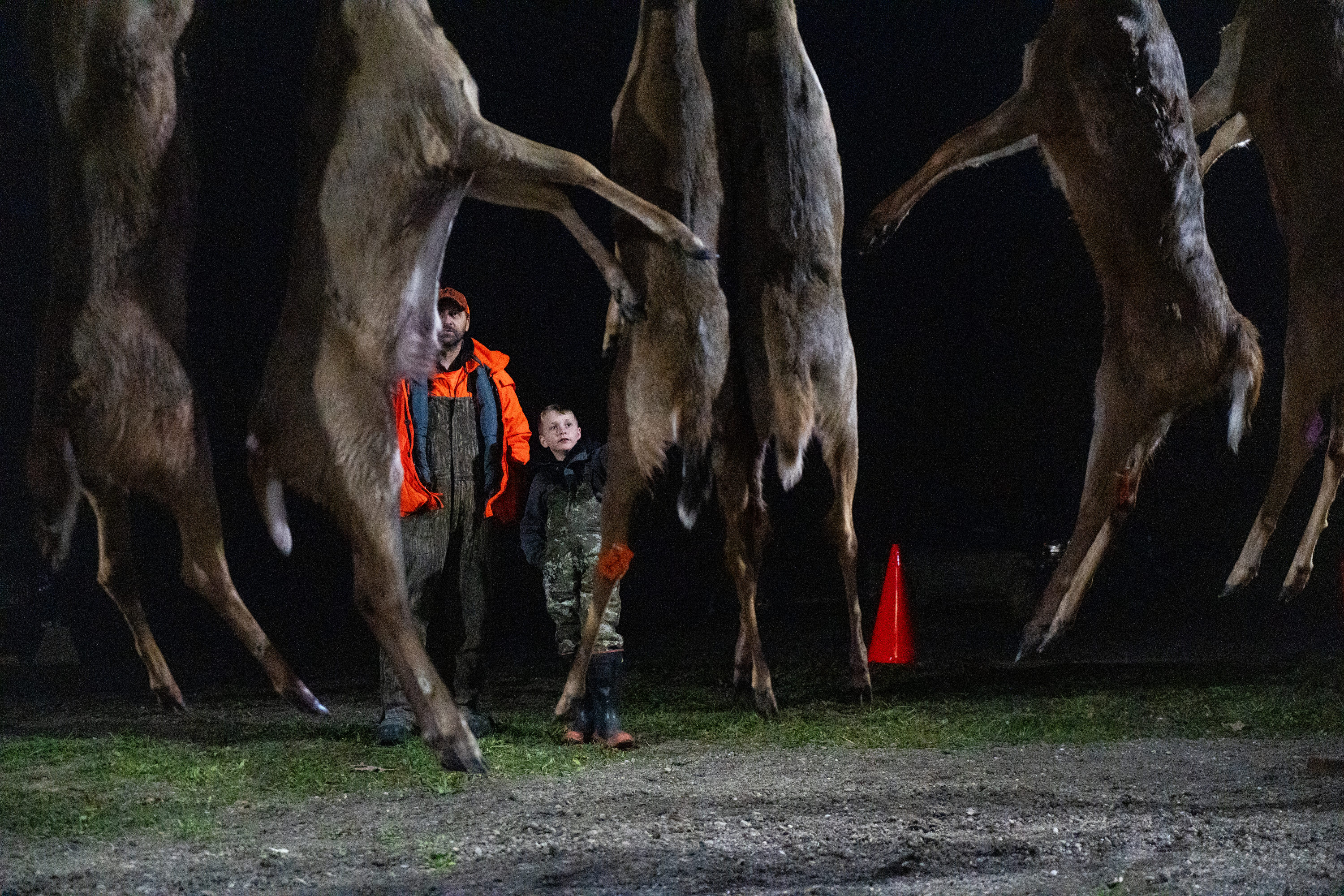 Hunters make their way to the buck poles on opening day - mlive.com