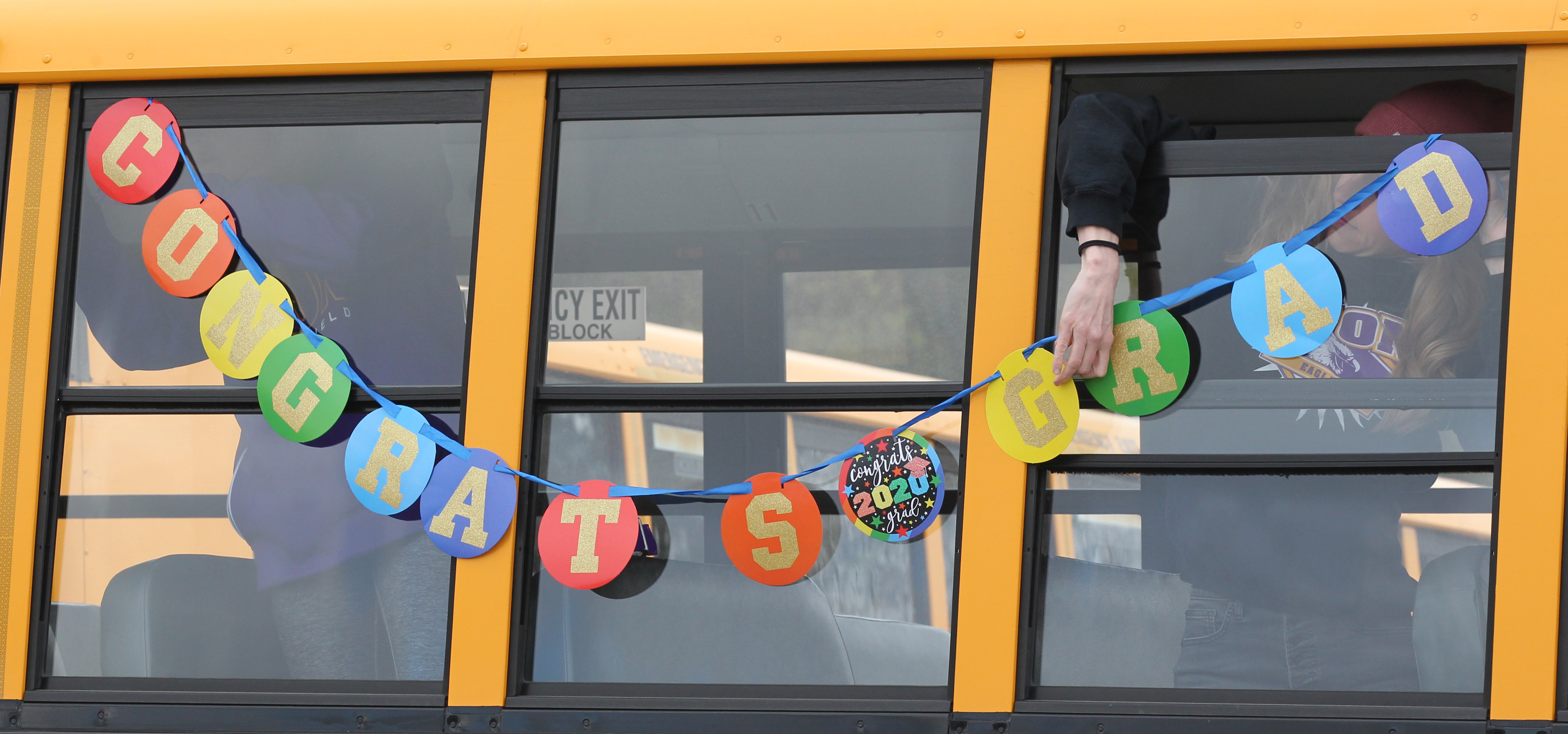 Avon High School uses school buses to deliver senior graduation signs ...
