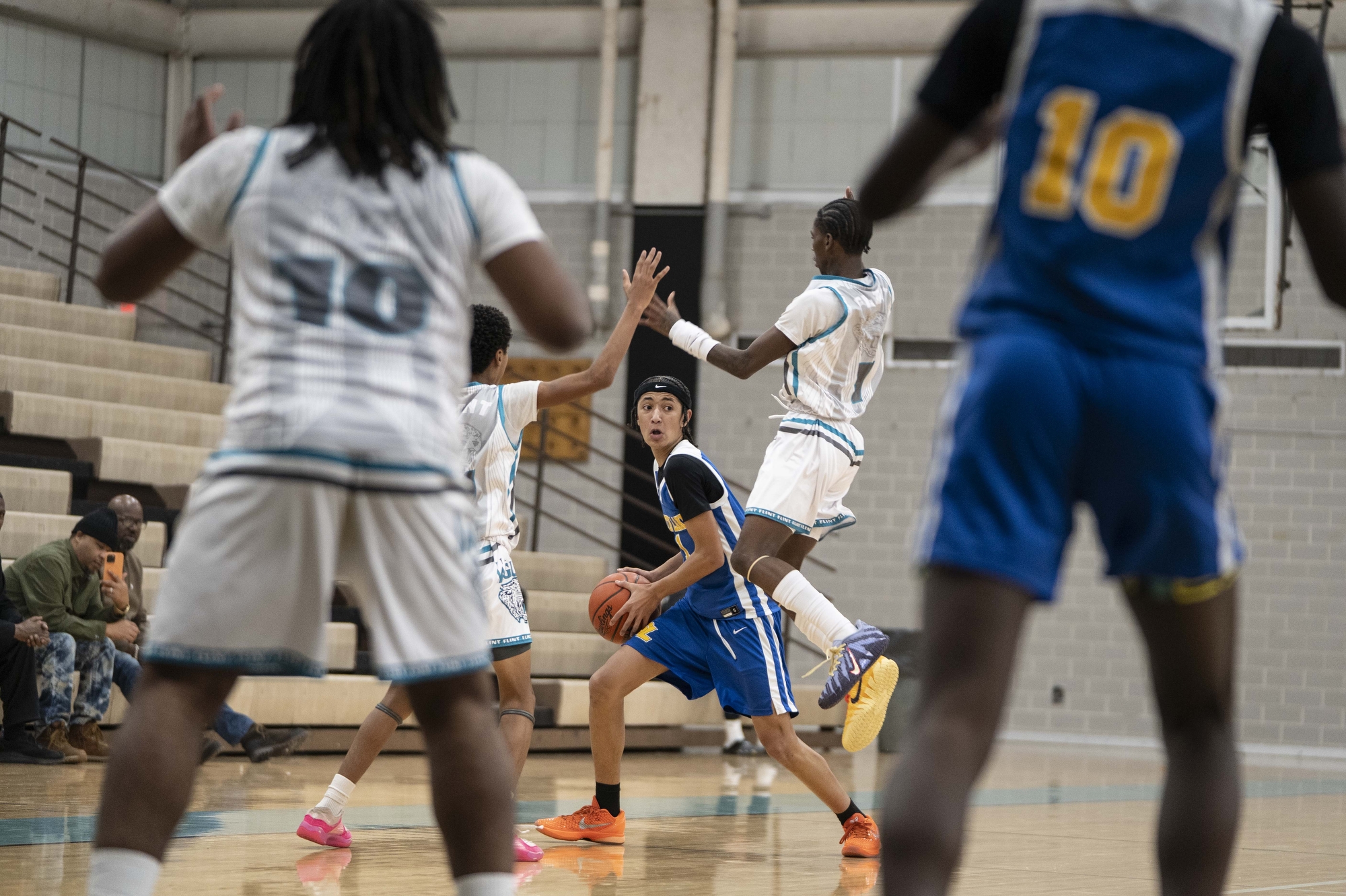 75 sports photos that showcase strength, determination in Flint and ...