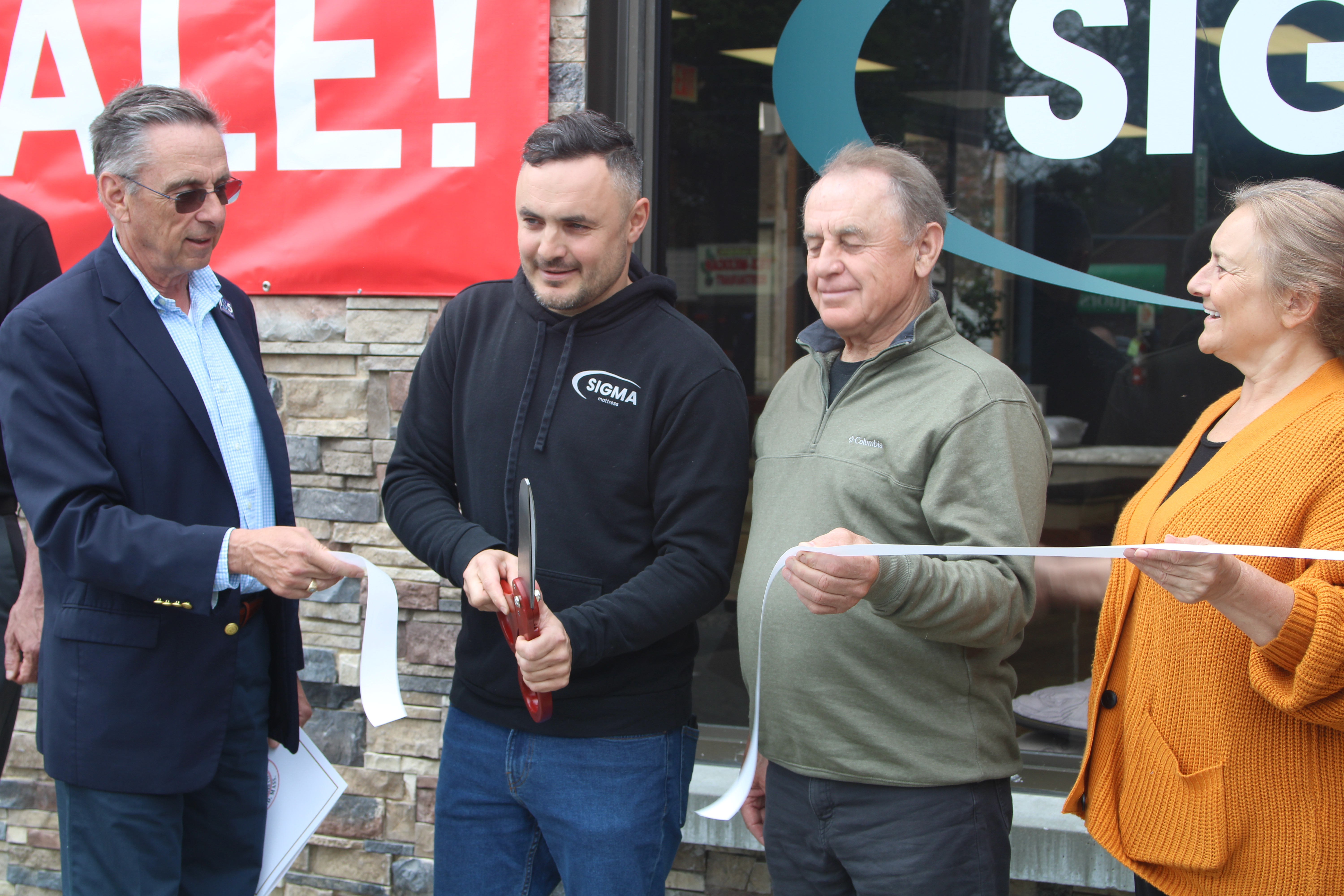 Sigma Mattress Ribbon Cutting 5-6 - masslive.com