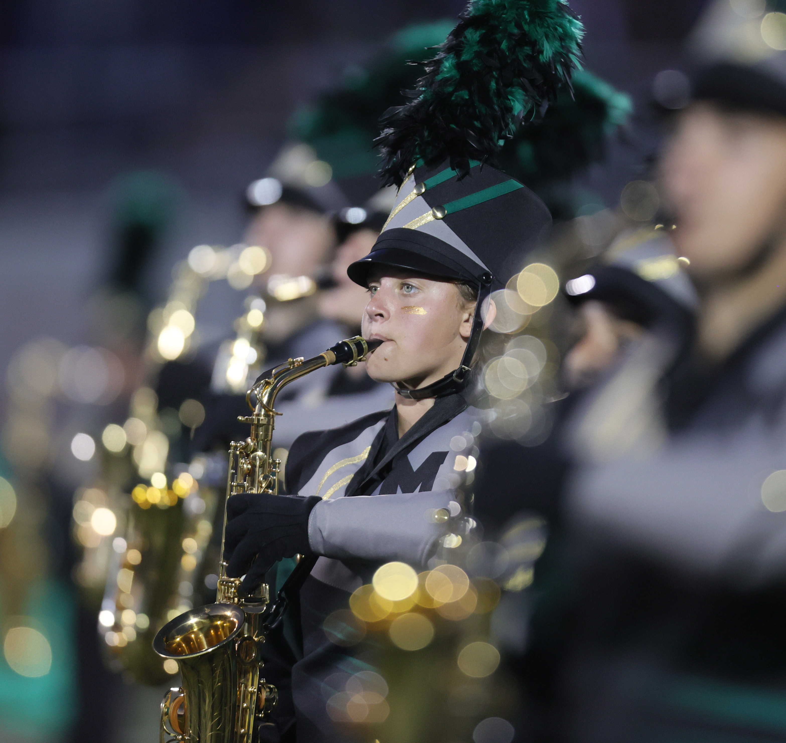Medina High School marching band performs during their game against ...