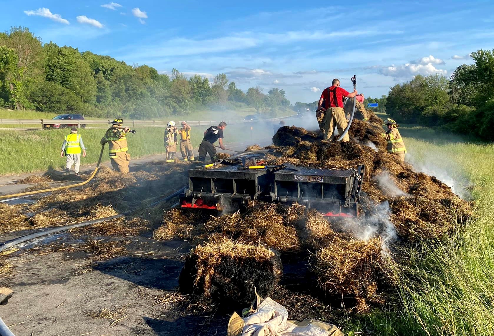 Truck hauling trailer of hay catches fire on I-81 South near Tully