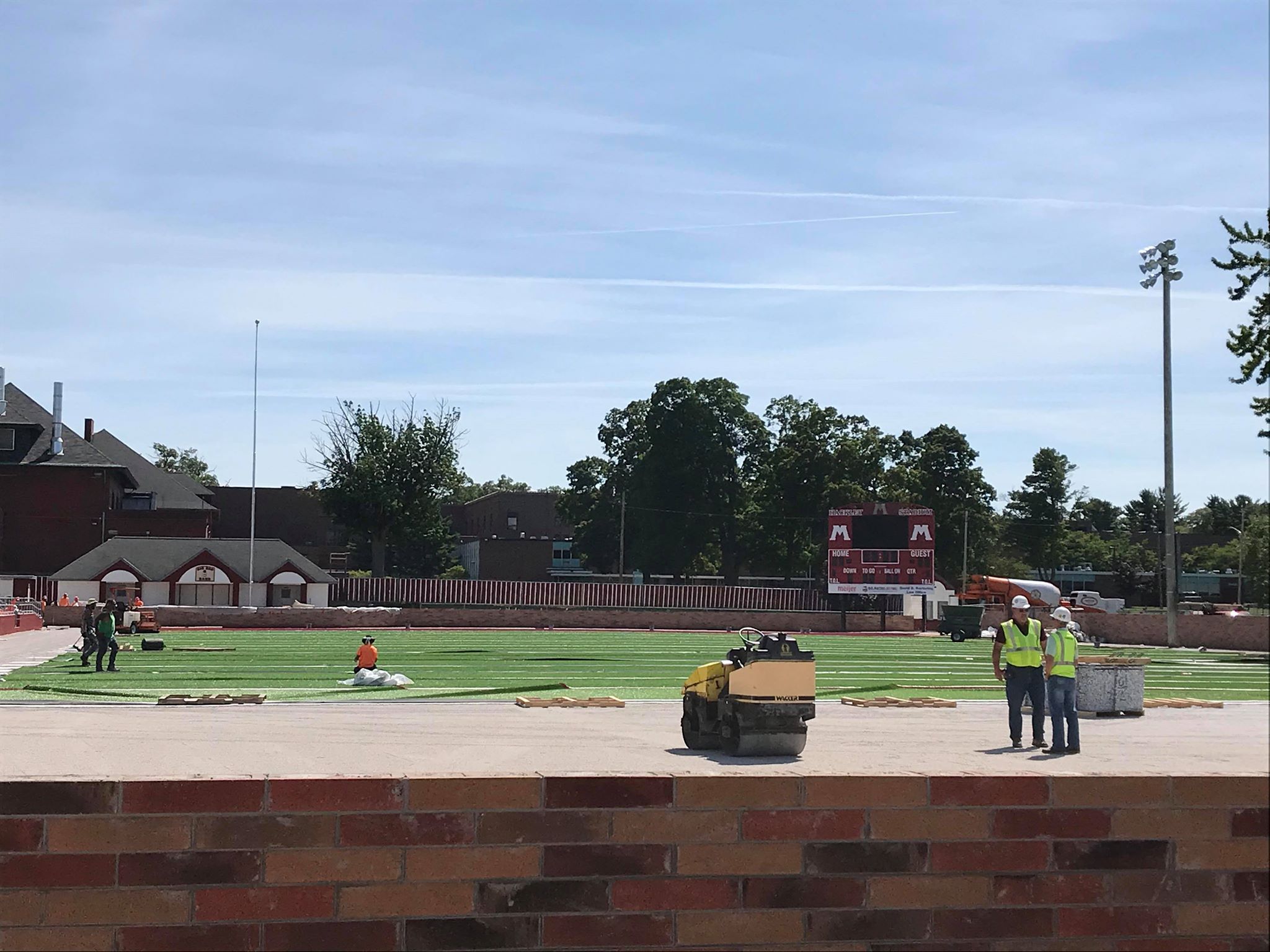 Local company DRC Enterprises installs AstroTurf at century-old Hackley Stadium in Muskegon ...
