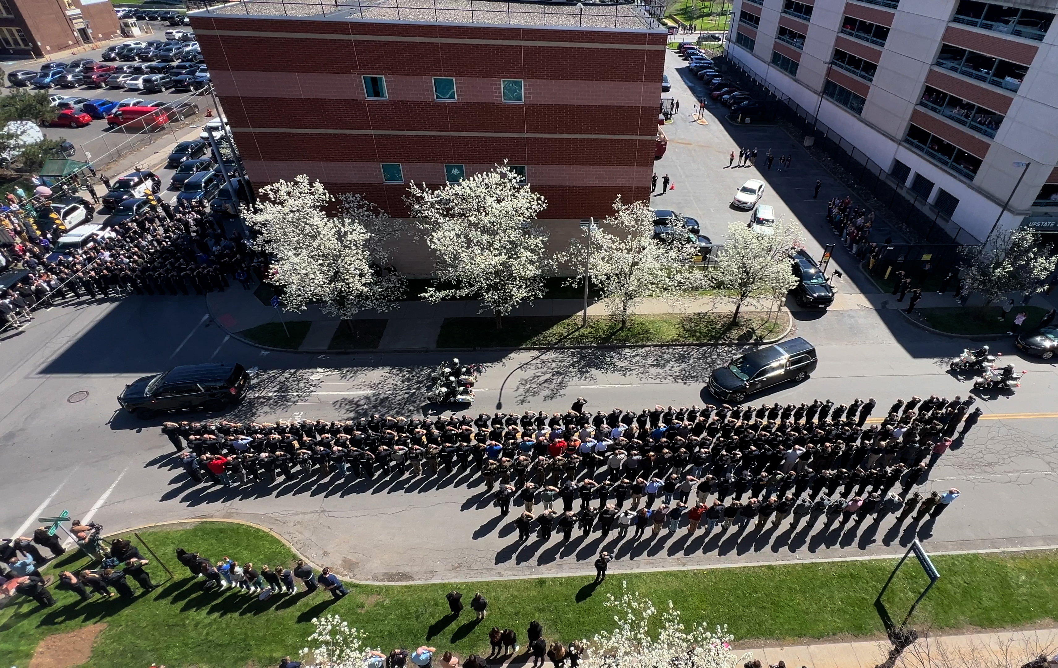 Police, firefighters honor Michael E. Jensen as his body is taken home ...