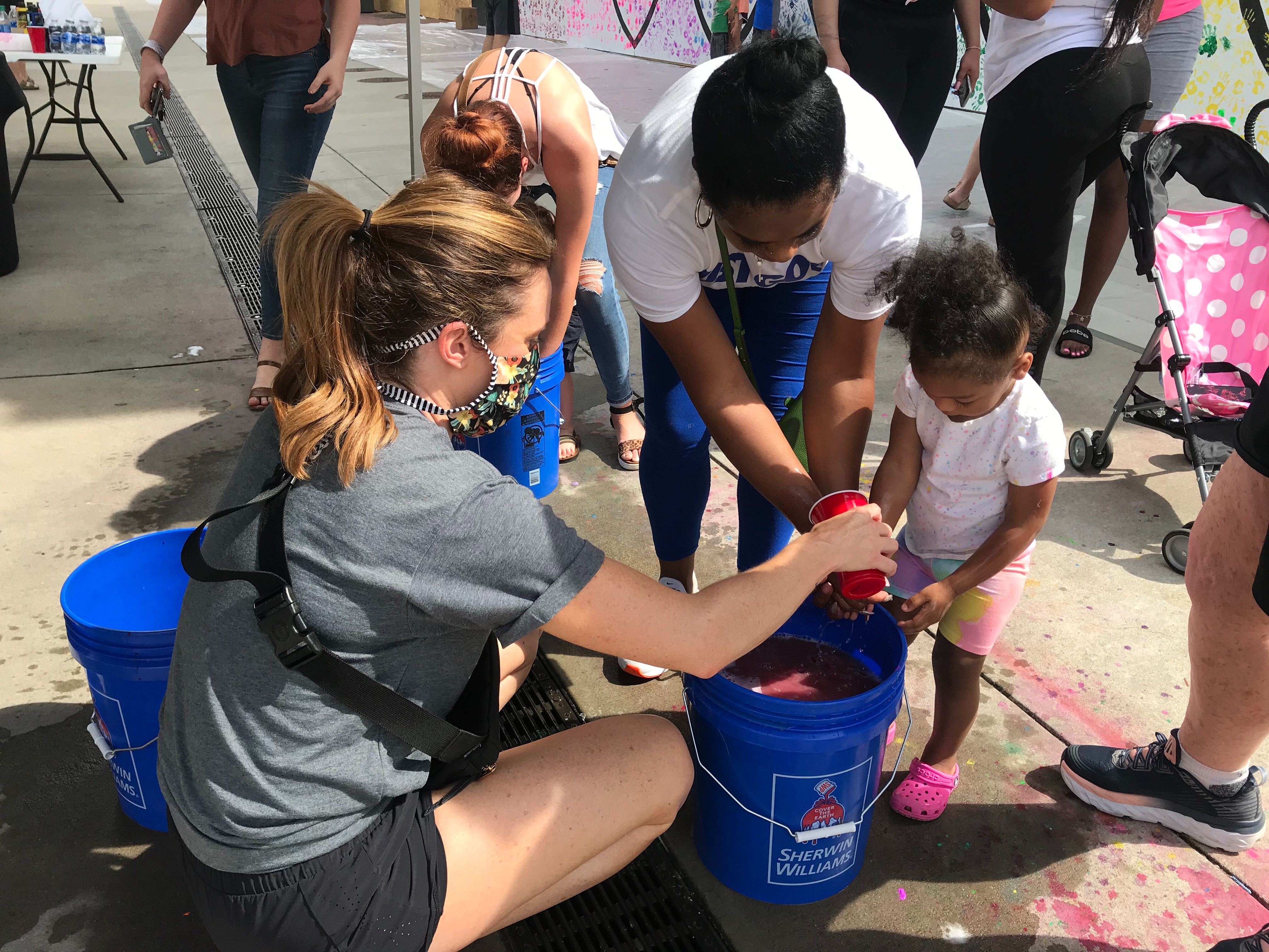 Mural day at the Pizitz Building - al.com
