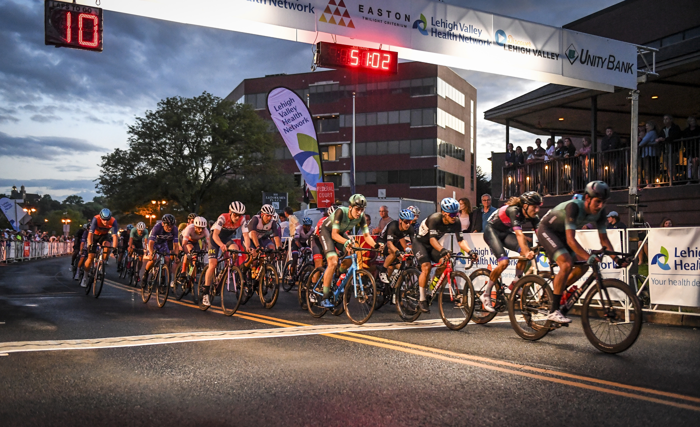 Bicyclists race through streets in 2022 Easton Twilight Criterium ...