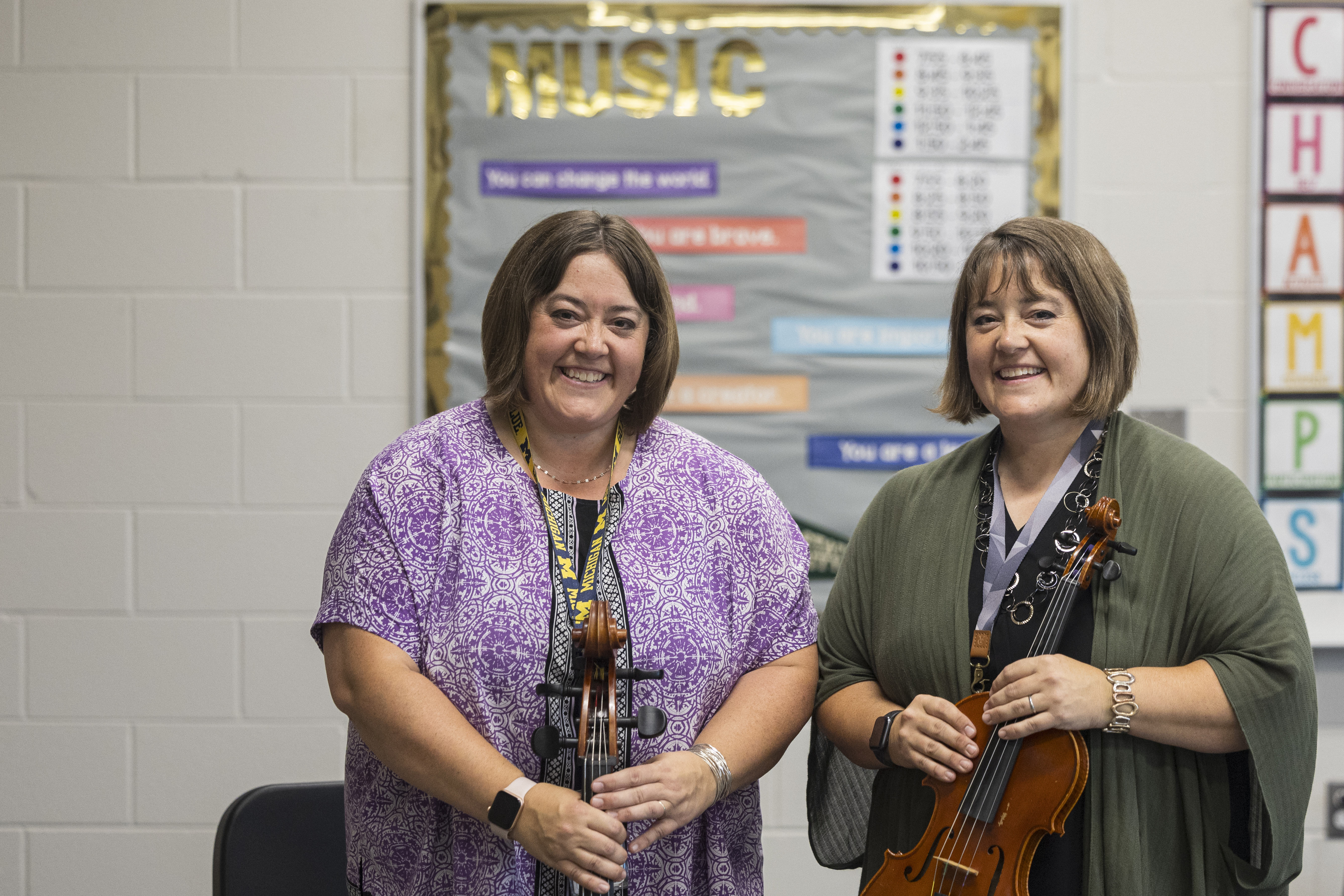 Identical twin sisters teach orchestra at Hudsonville Public Schools ...
