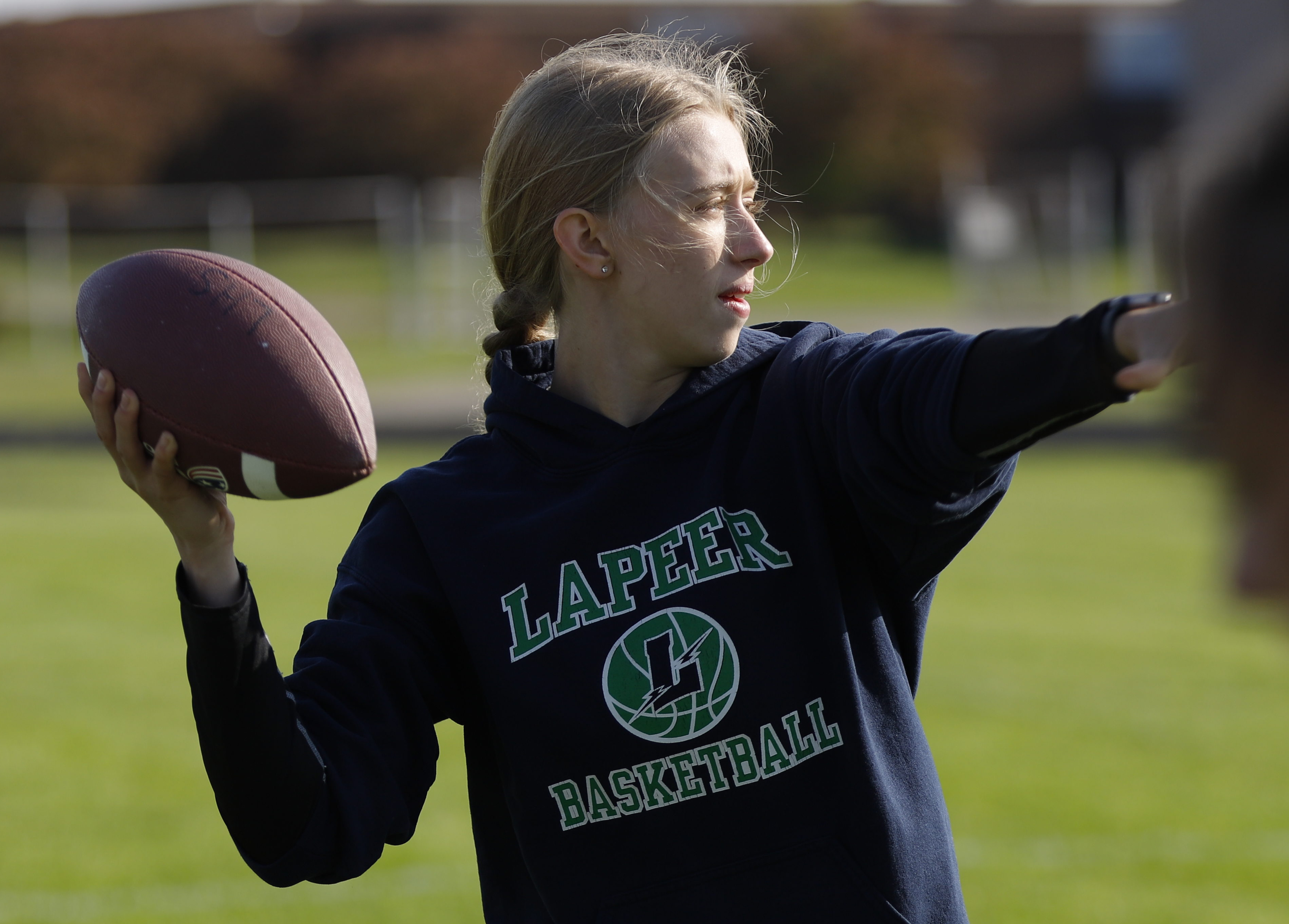 Lapeer high school girls participate in flag football pilot league ...