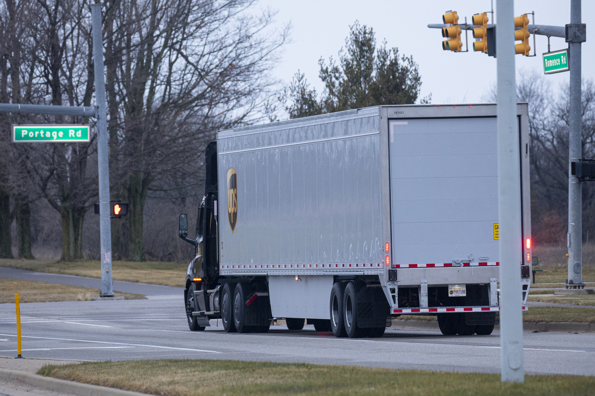 Trucks carrying COVID-19 vaccine depart Pfizer plant in Portage ...