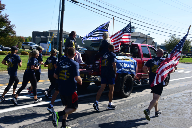Warren County police hit the streets in Torch Run to benefit Special ...