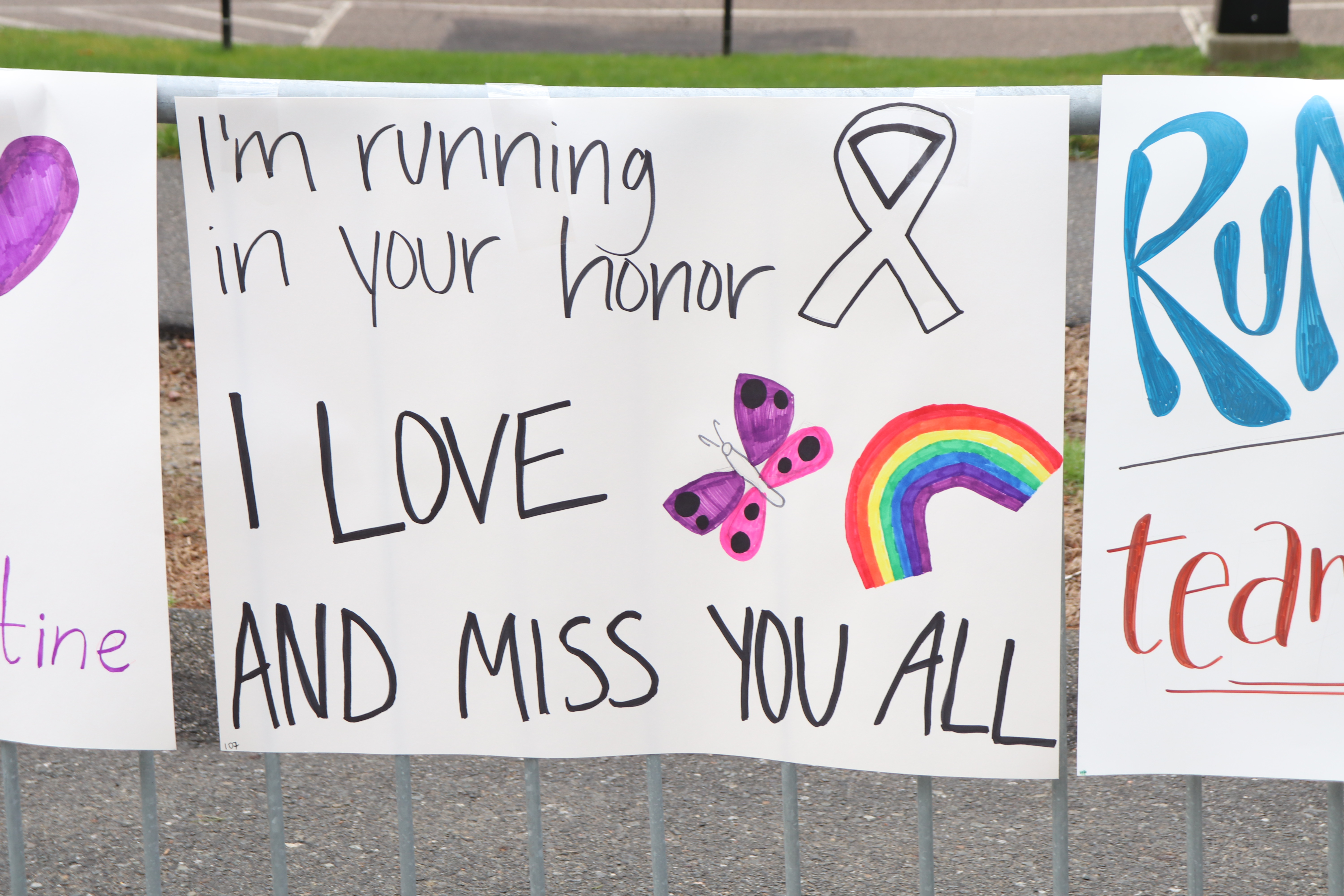 Creative signs along the 2024 Boston Marathon race route at Wellesley ...