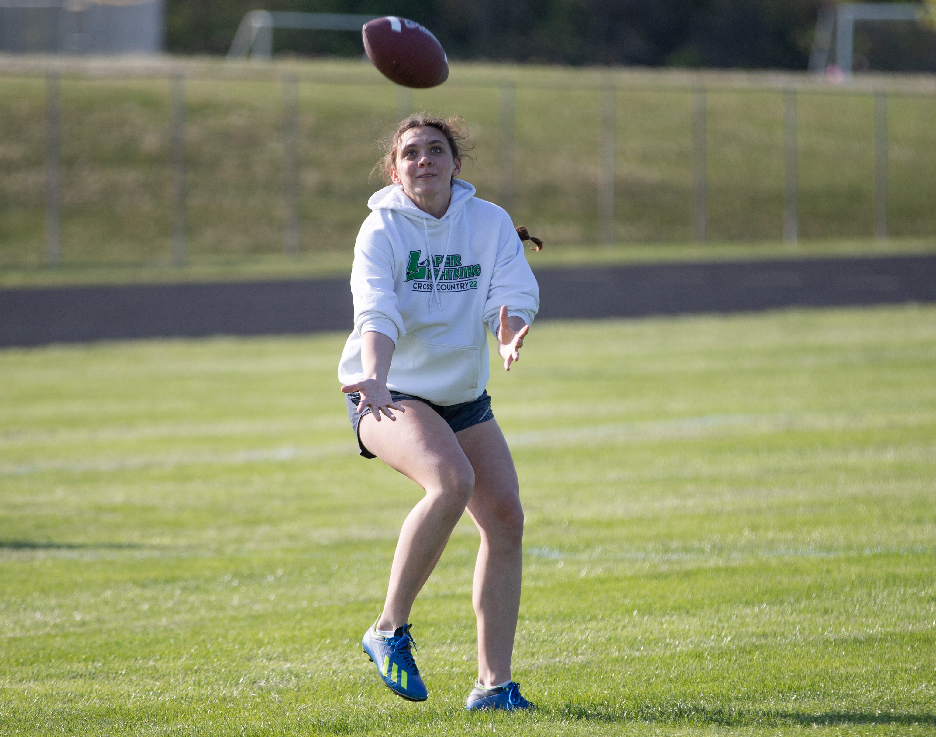 Lapeer high school girls participate in flag football pilot league ...