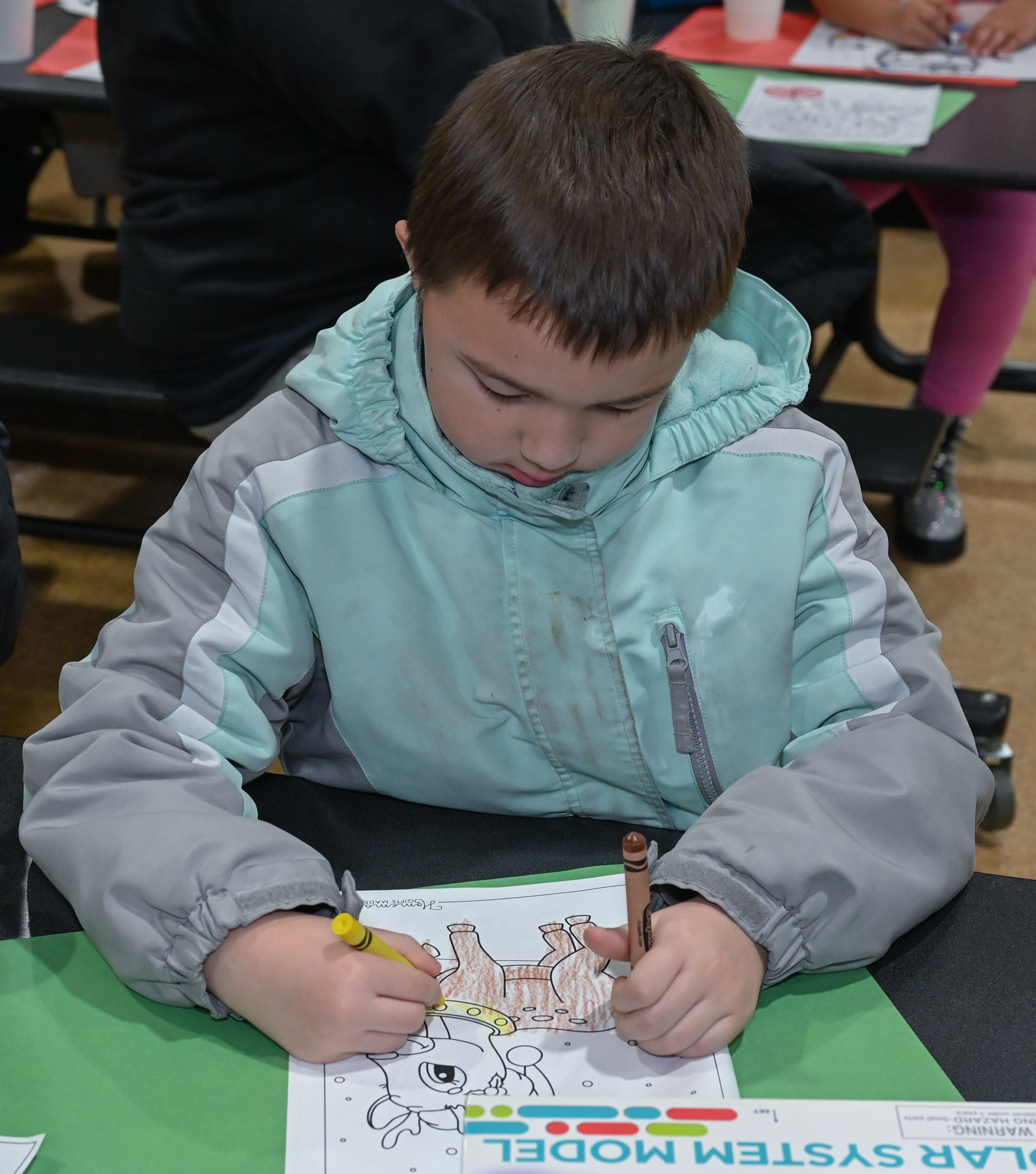 Students, families enjoy Cookies and Cocoa with Santa at Donahue School in Holyoke - masslive.com