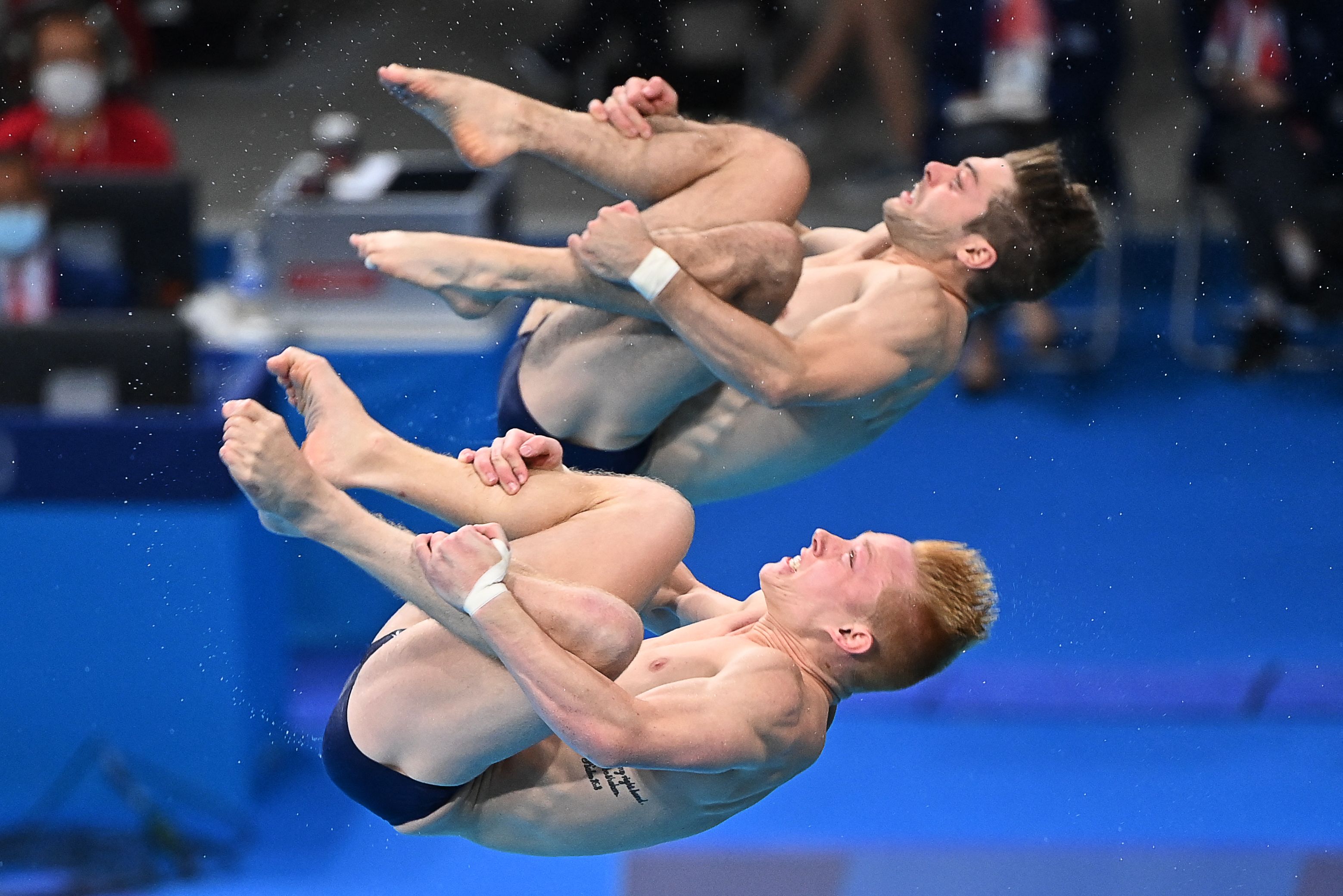 Amherst native Michael Hixon and partner take silver in Olympic synchro ...