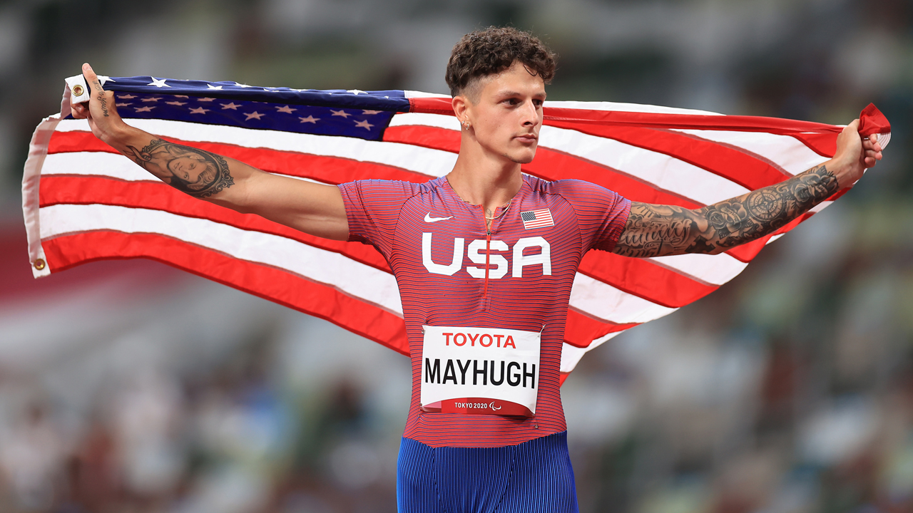 Photos: Paralympic sprinter Nick Mayhugh wins gold, sets world record ...