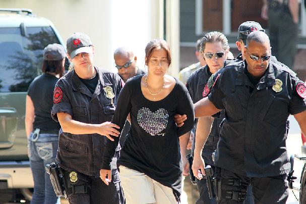 Andrea Sneiderman taken into custody and facing 8 counts – 95.5 WSB