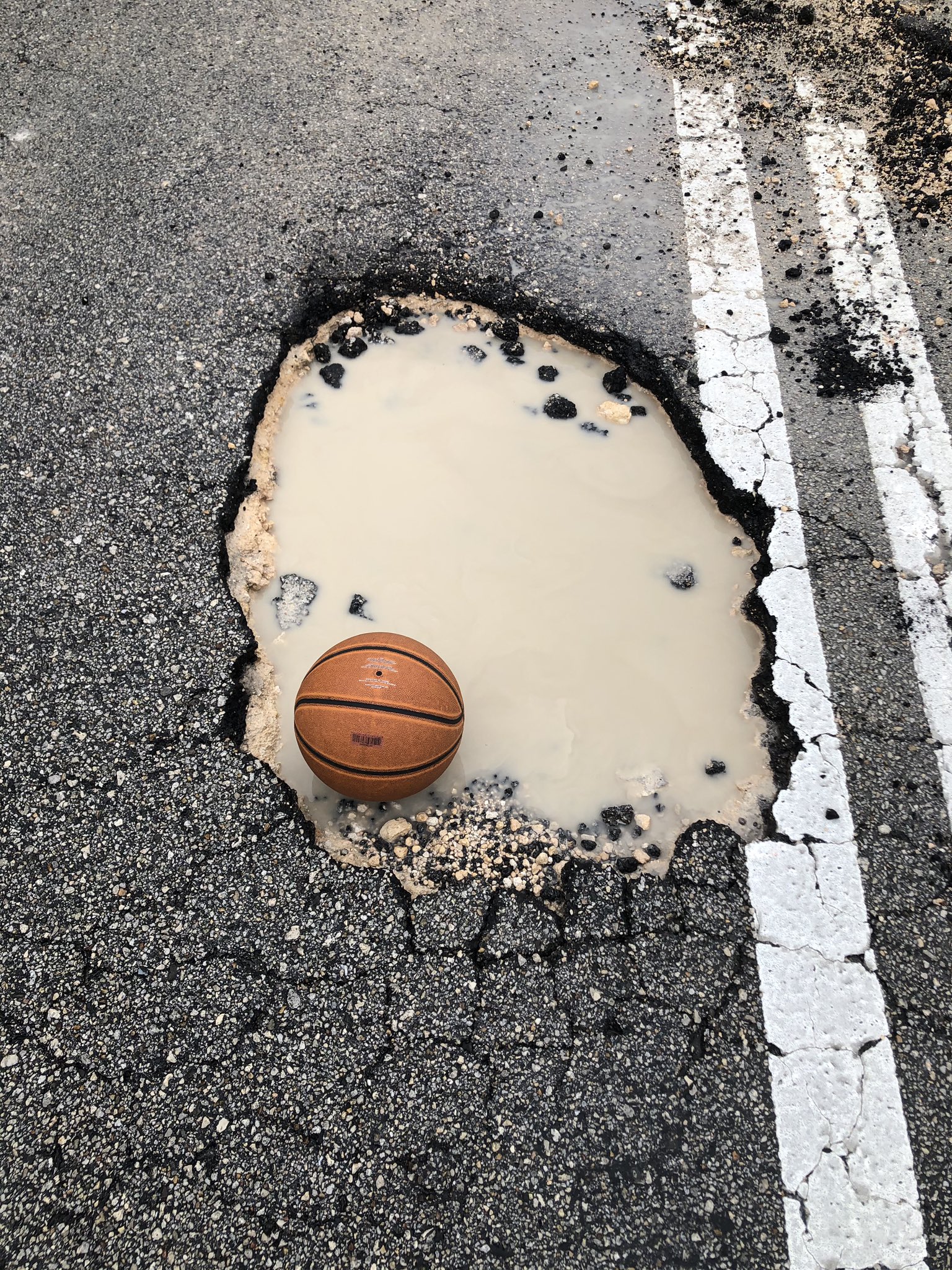 Neighbors raising safety concerns about two deep potholes in Bartram ...