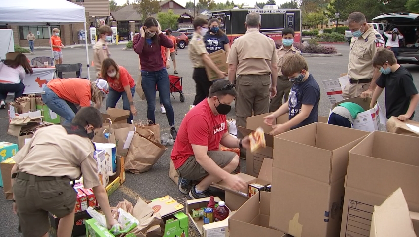 Volunteers come together in unique food drive for families in need
