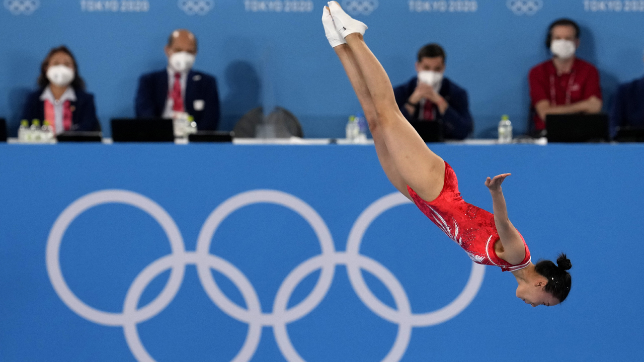 Photos: China claims gold, silver in women's trampoline at Tokyo ...