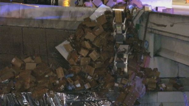 FedEx truck crash dumps packages over I-4, closes lanes – WDBO