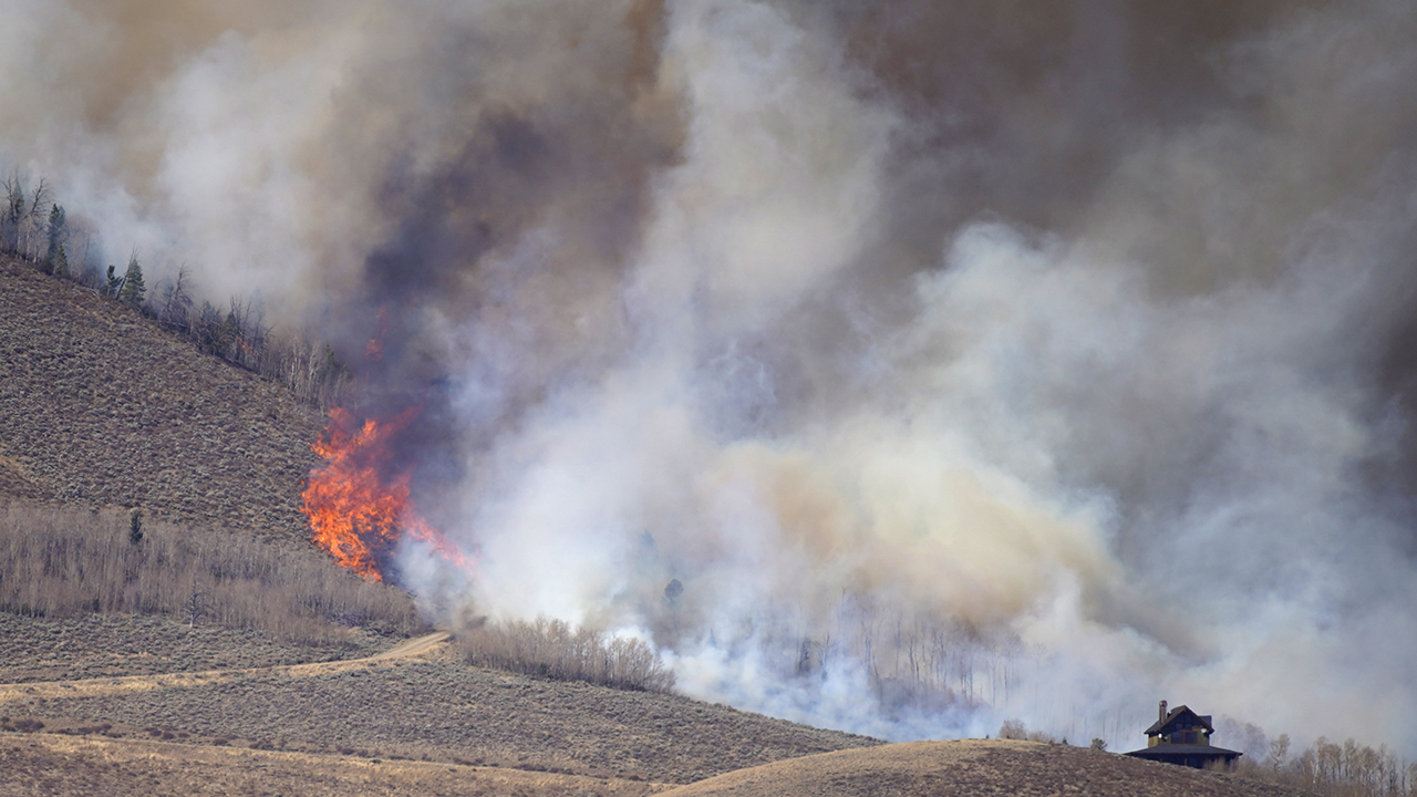 Photos: Colorado wildfires force thousands to evacuate – WDBO