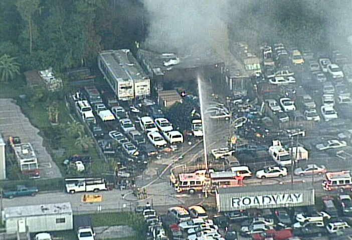 Crews battle junk yard fire in Orange County – WDBO