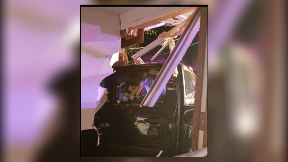 Truck hits Perry Twp. house in possible OVI crash