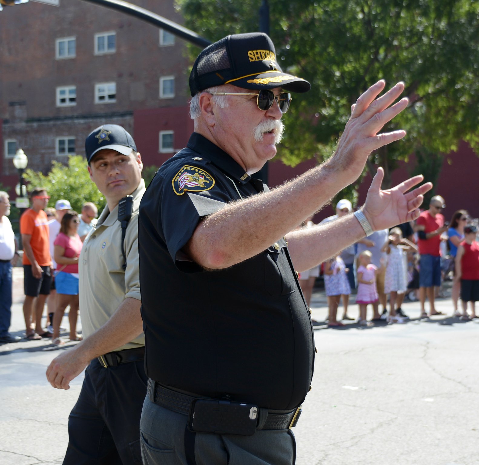 Butler County parade-goers line streets despite high termps