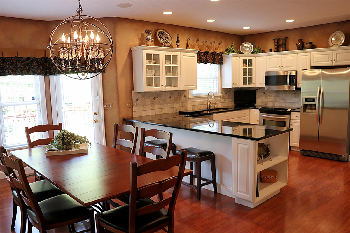 Open rec room highlights brick 2-story’s lower level