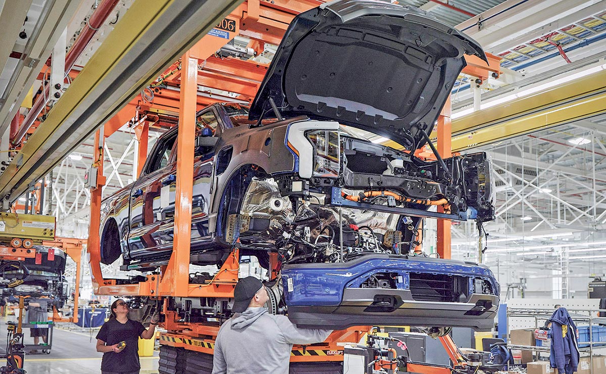 Layoffs at battery companies as EV timelines are delayed - Automotive News